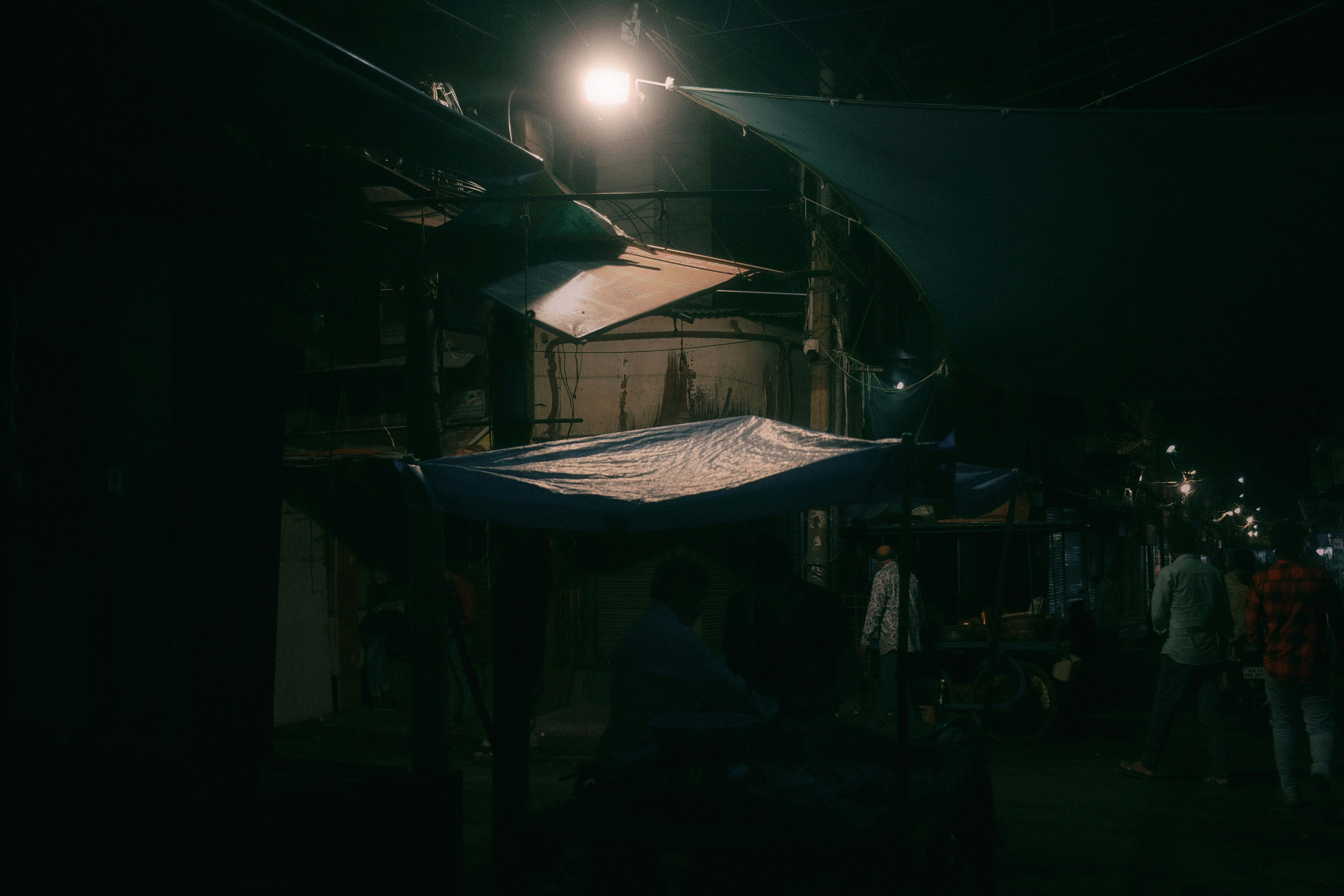 Night Market Under a Flickering Light