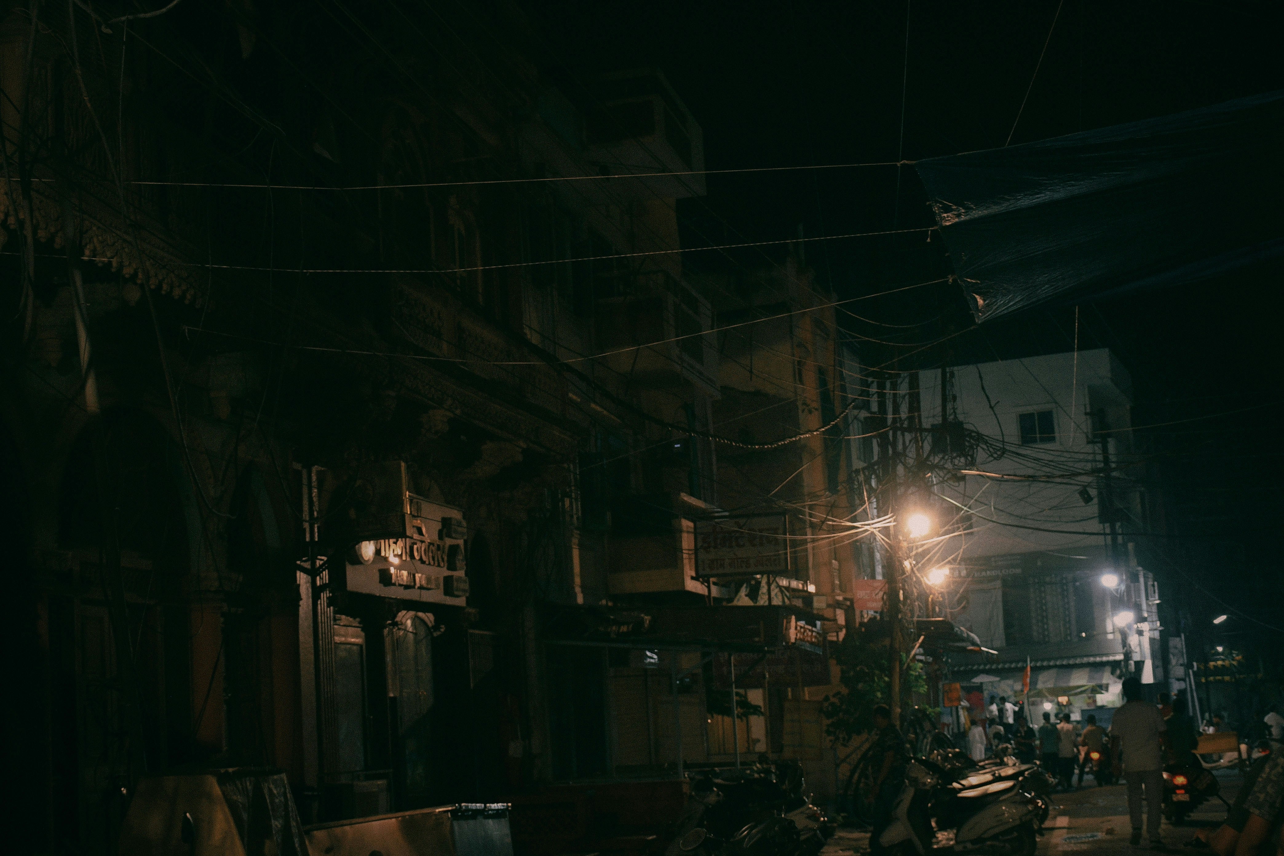 Low-Lit Alleyways: Neon Hue and Electric Air
