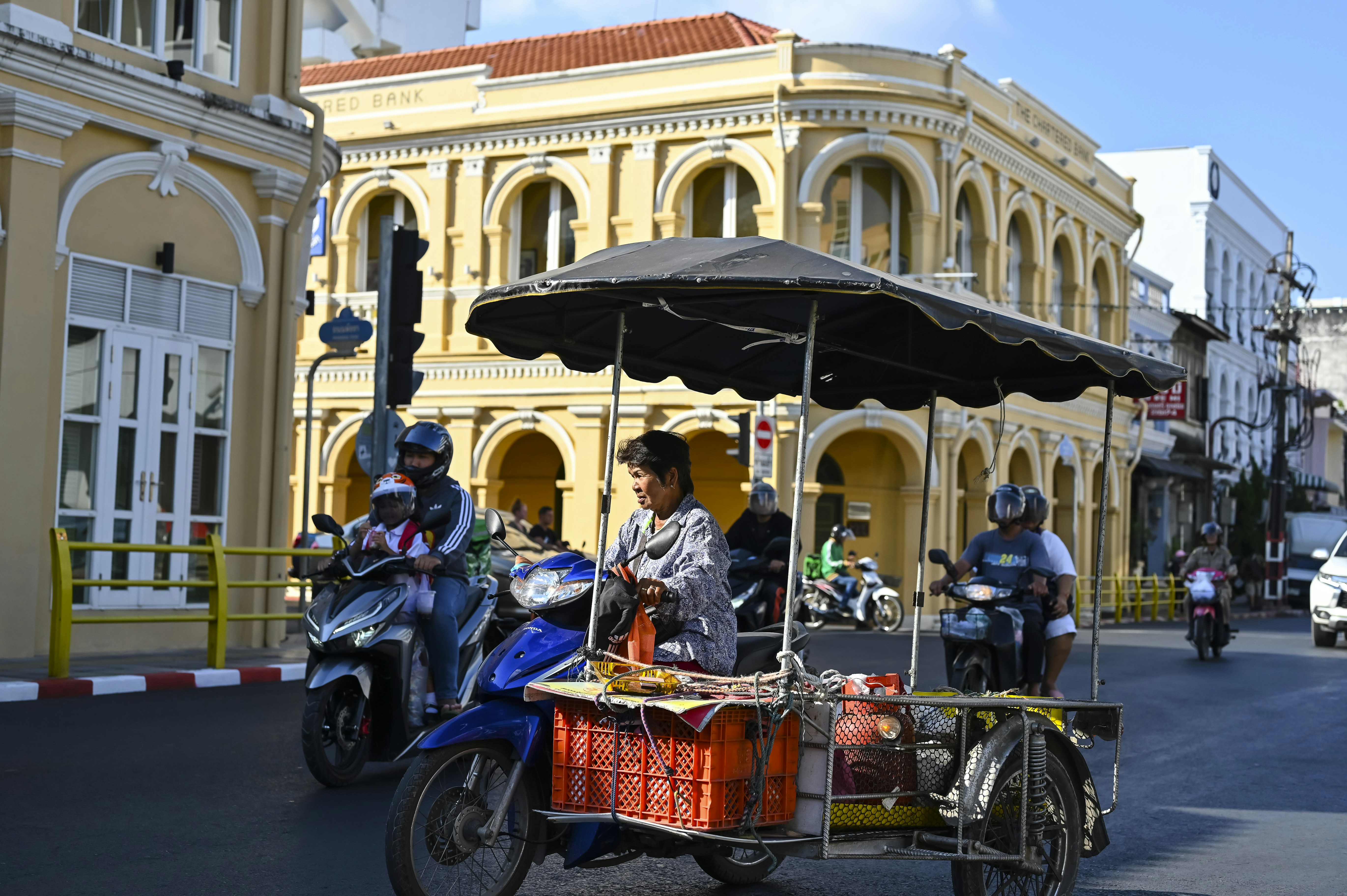 Street Cart in Front of Historic Yellow Arcade