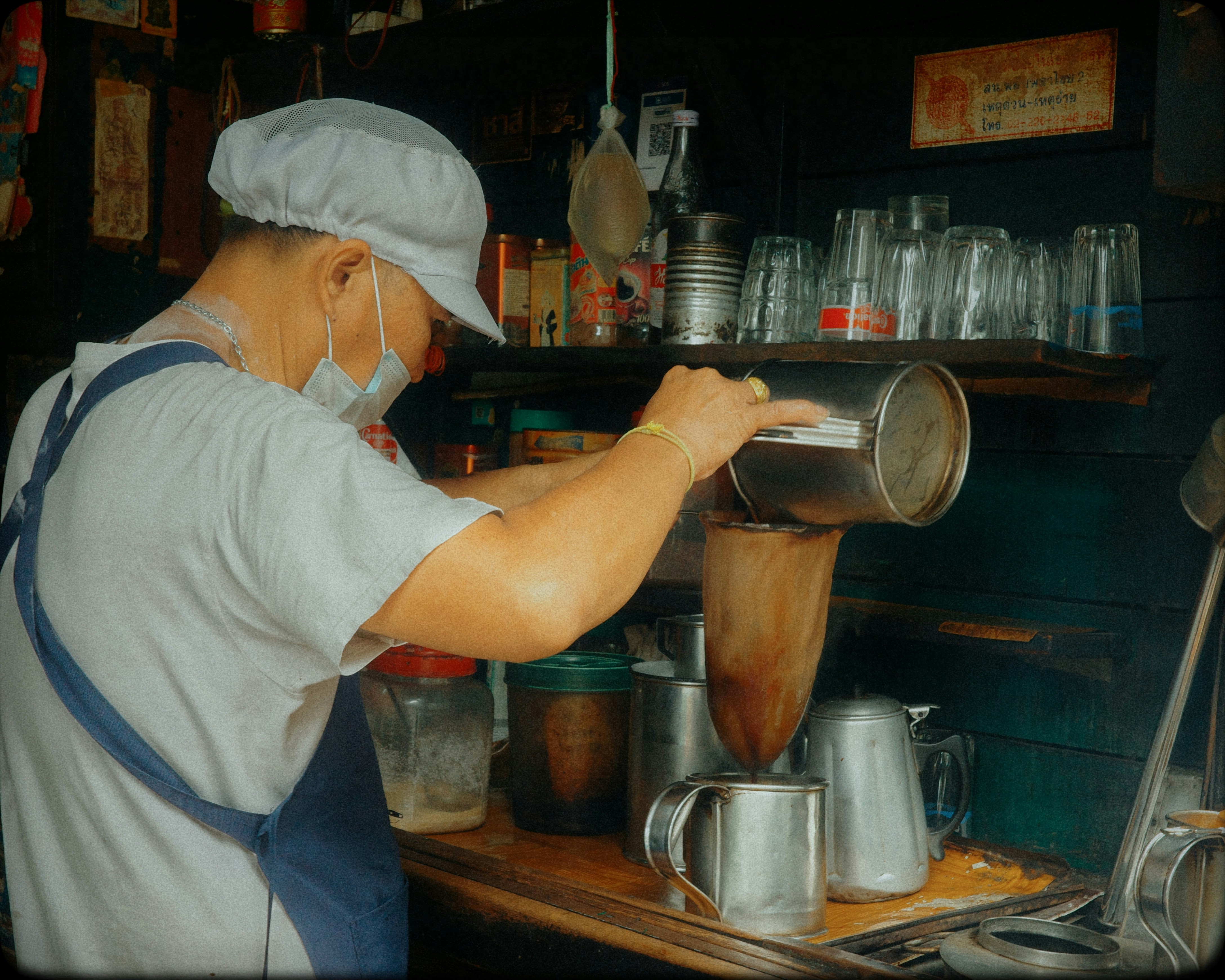 Pouring Steam: A Barista at Work in a Humble Kitchen