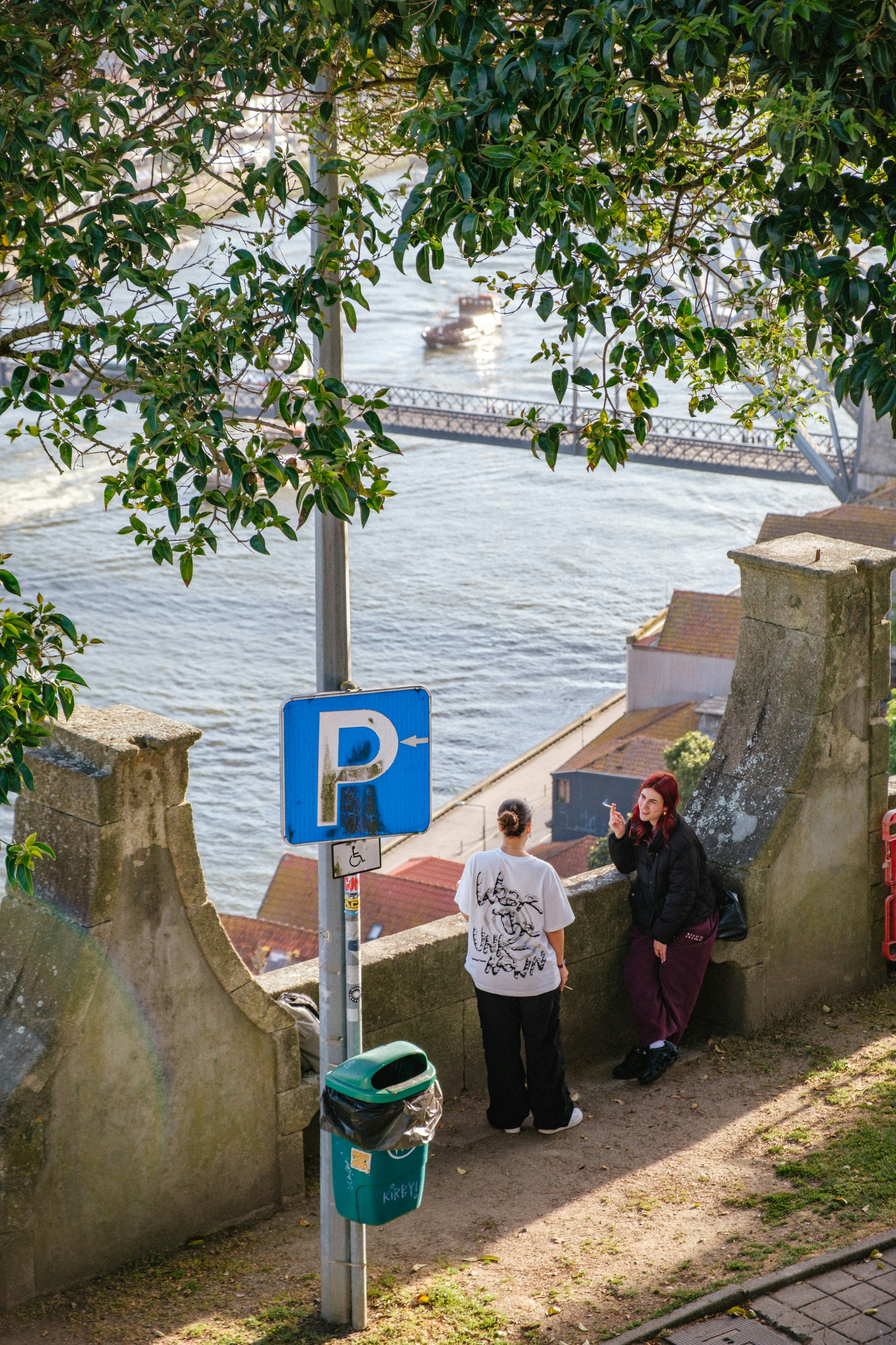 Riverside Pause: Friends at the Water’s Edge
