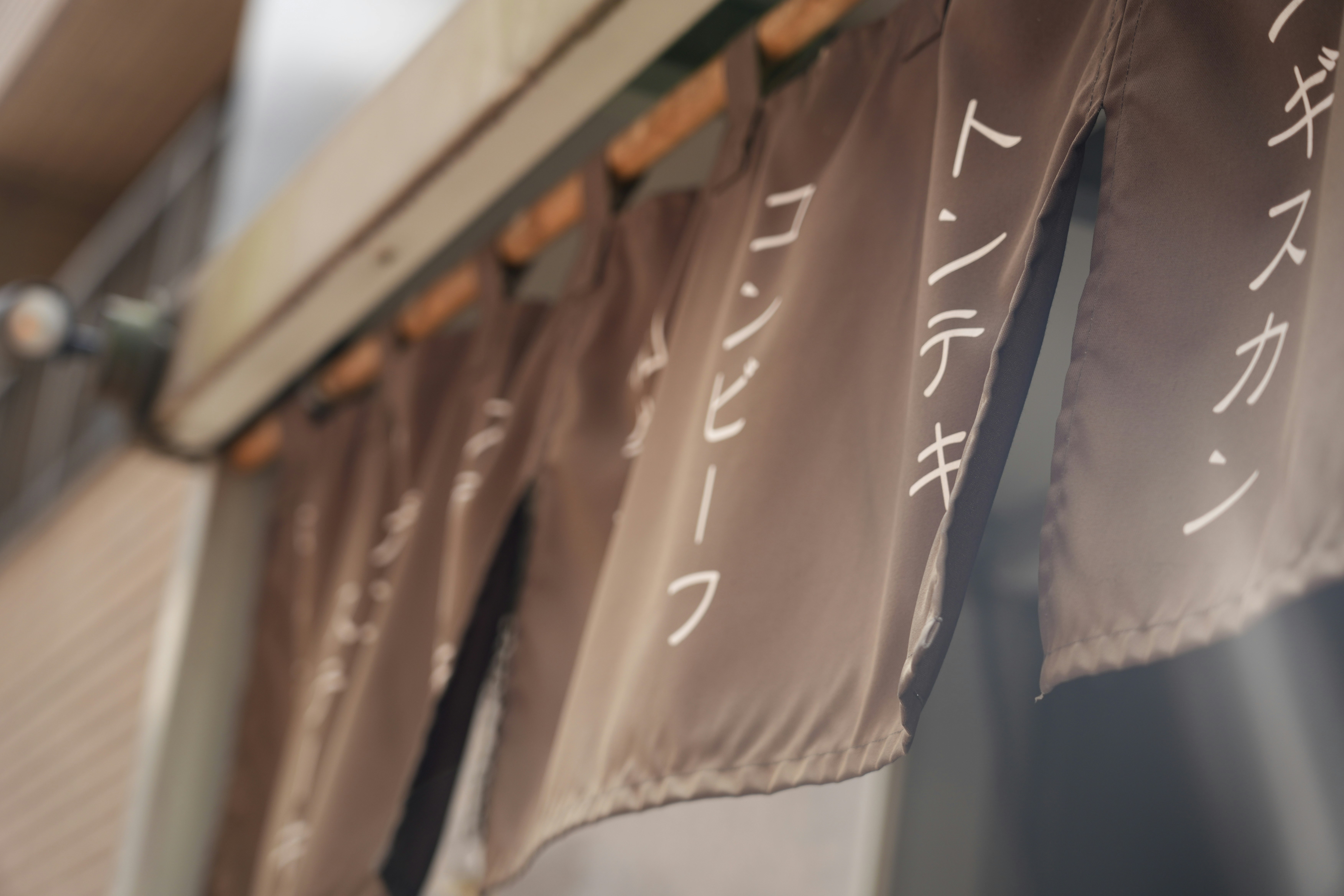 Sunlit Cloth Canopy at a Quiet Japanese Street Market