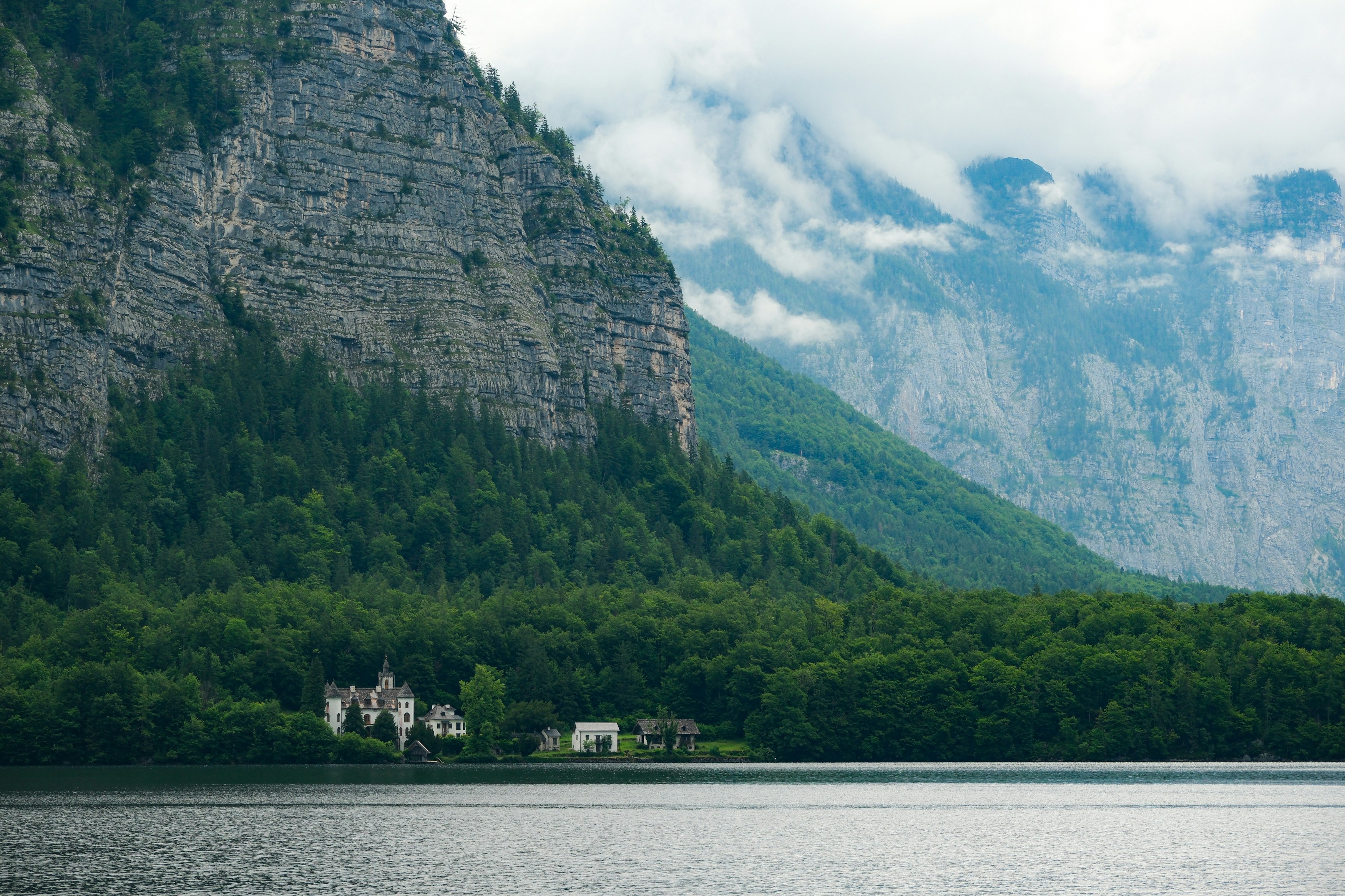 Lakeside Hamlet at the Foot of a Misty Cliff