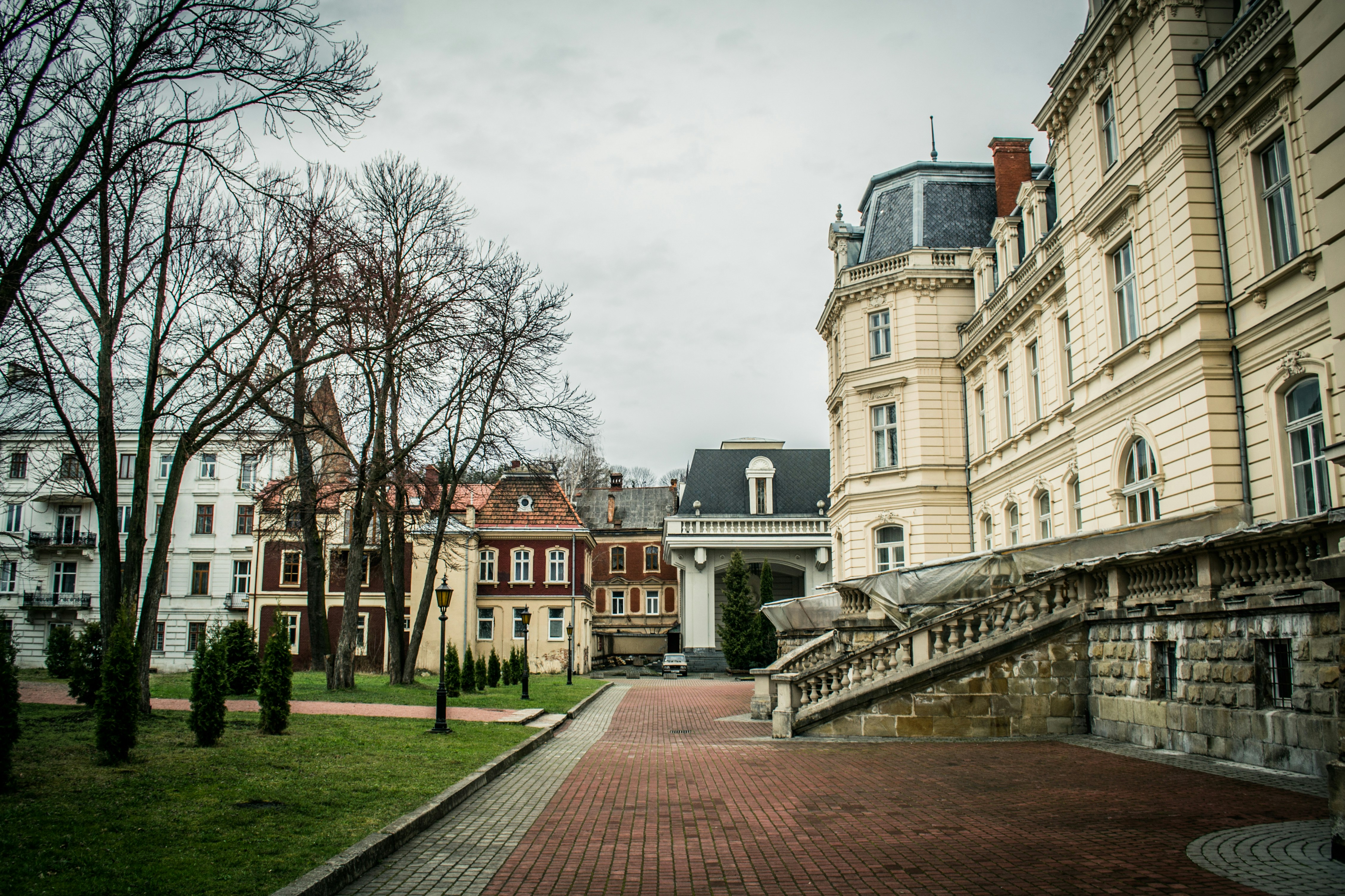 Grand Crescent: Brick Walkway Leading to Elegant Facades