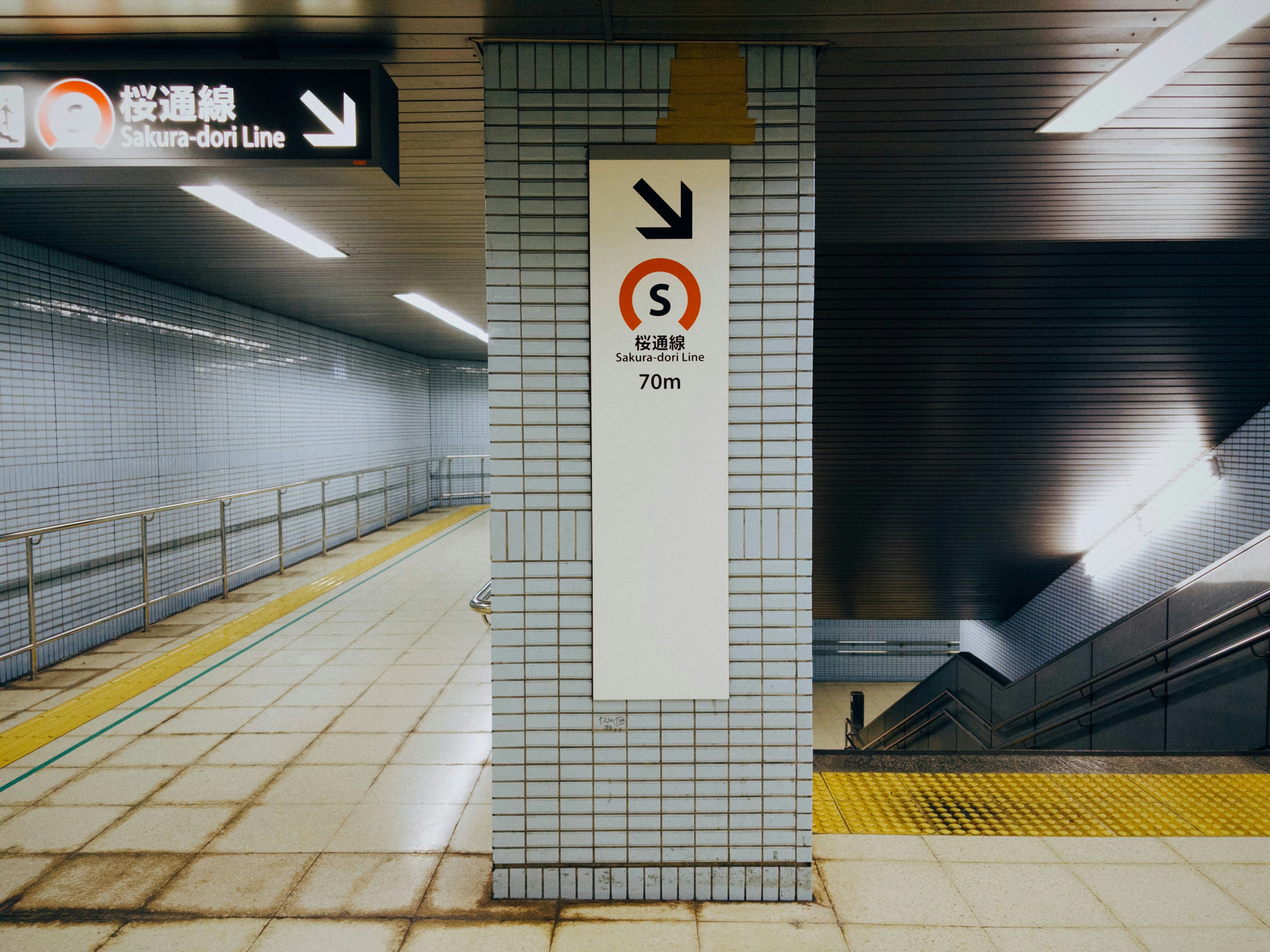 Shaft of Silence: Center Pillar in an Empty Subway Hall