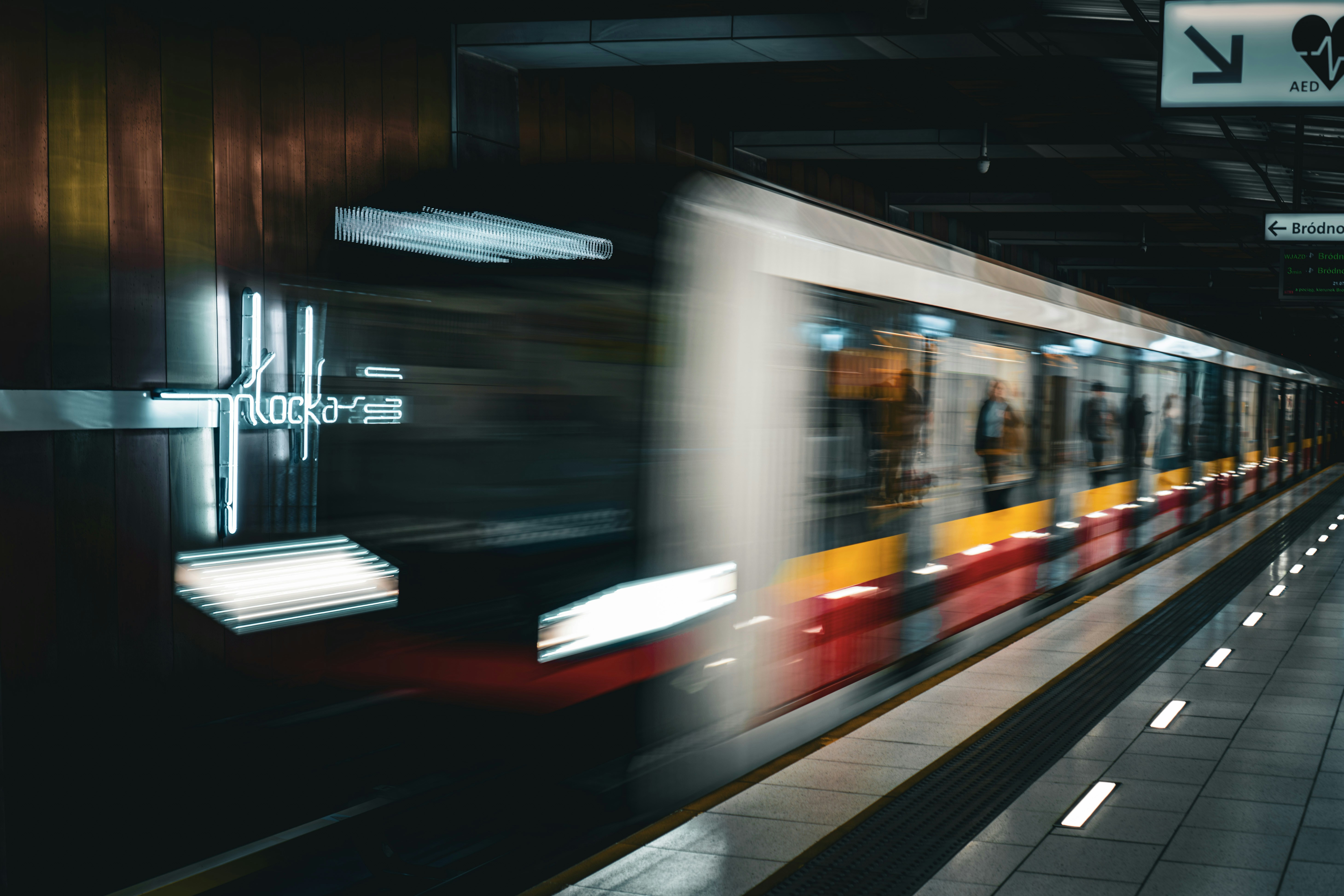 Blurred Metro in Motion: Night Platform Leap