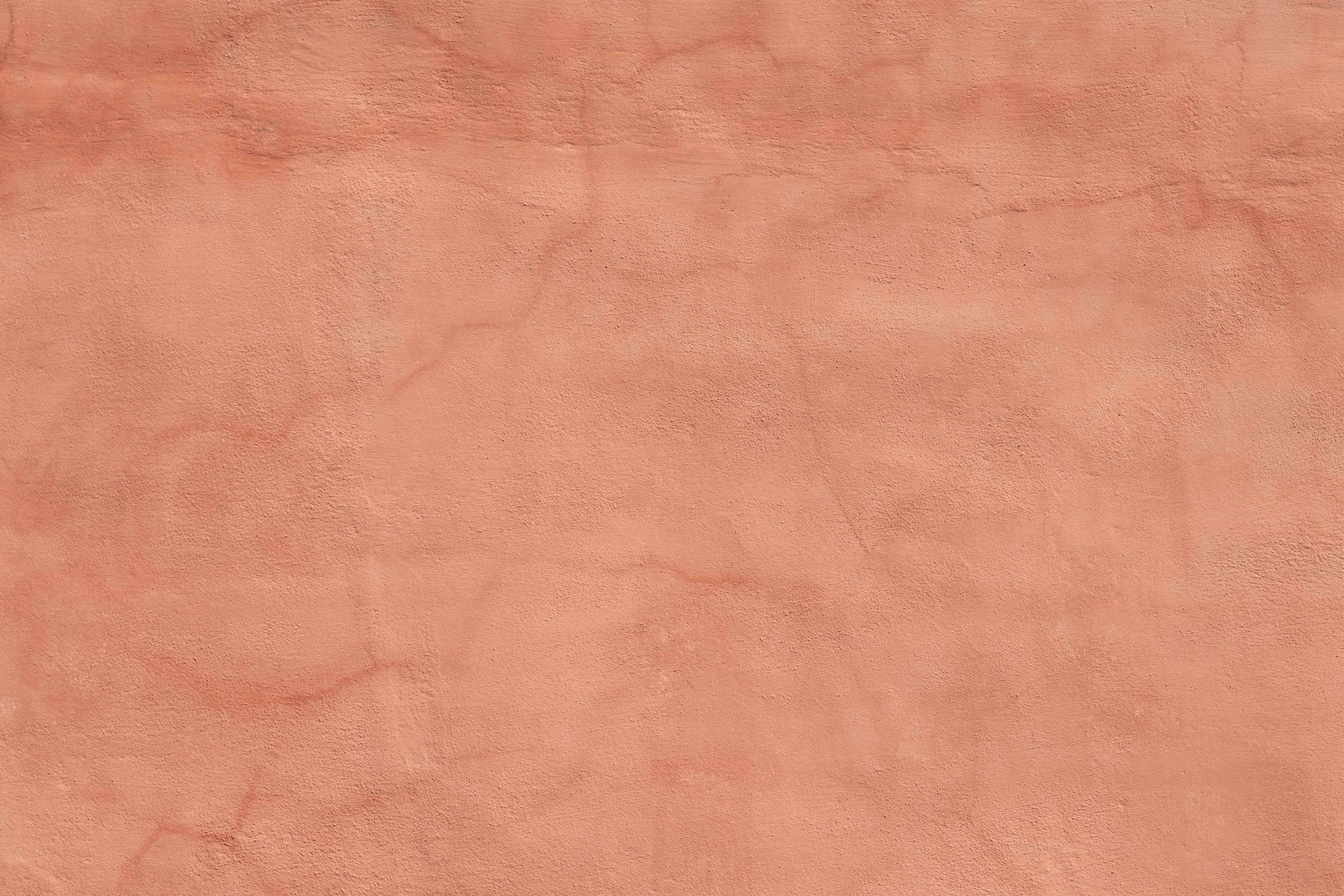 Peach Wall Texture: Subtle Inward Shadows and Soft Stone-like Valleys
