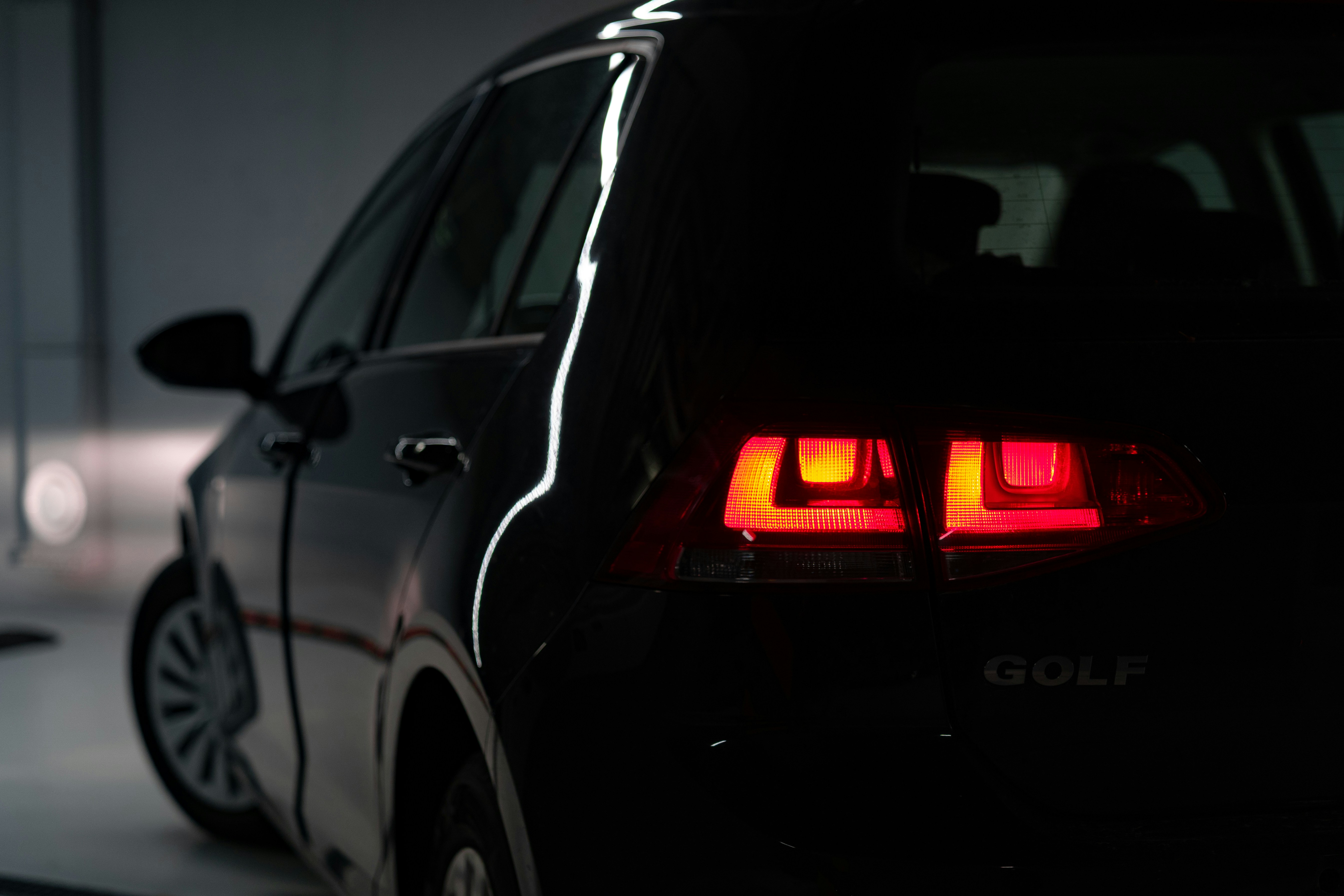 Rear Glow: The Golf’s Quiet Power in a Dim Garage