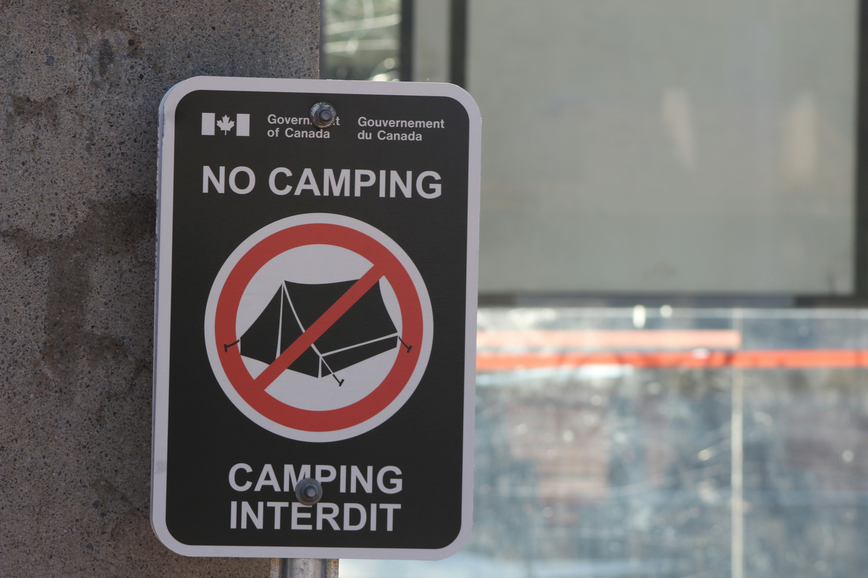 No Camping Sign in Urban Construction Zone