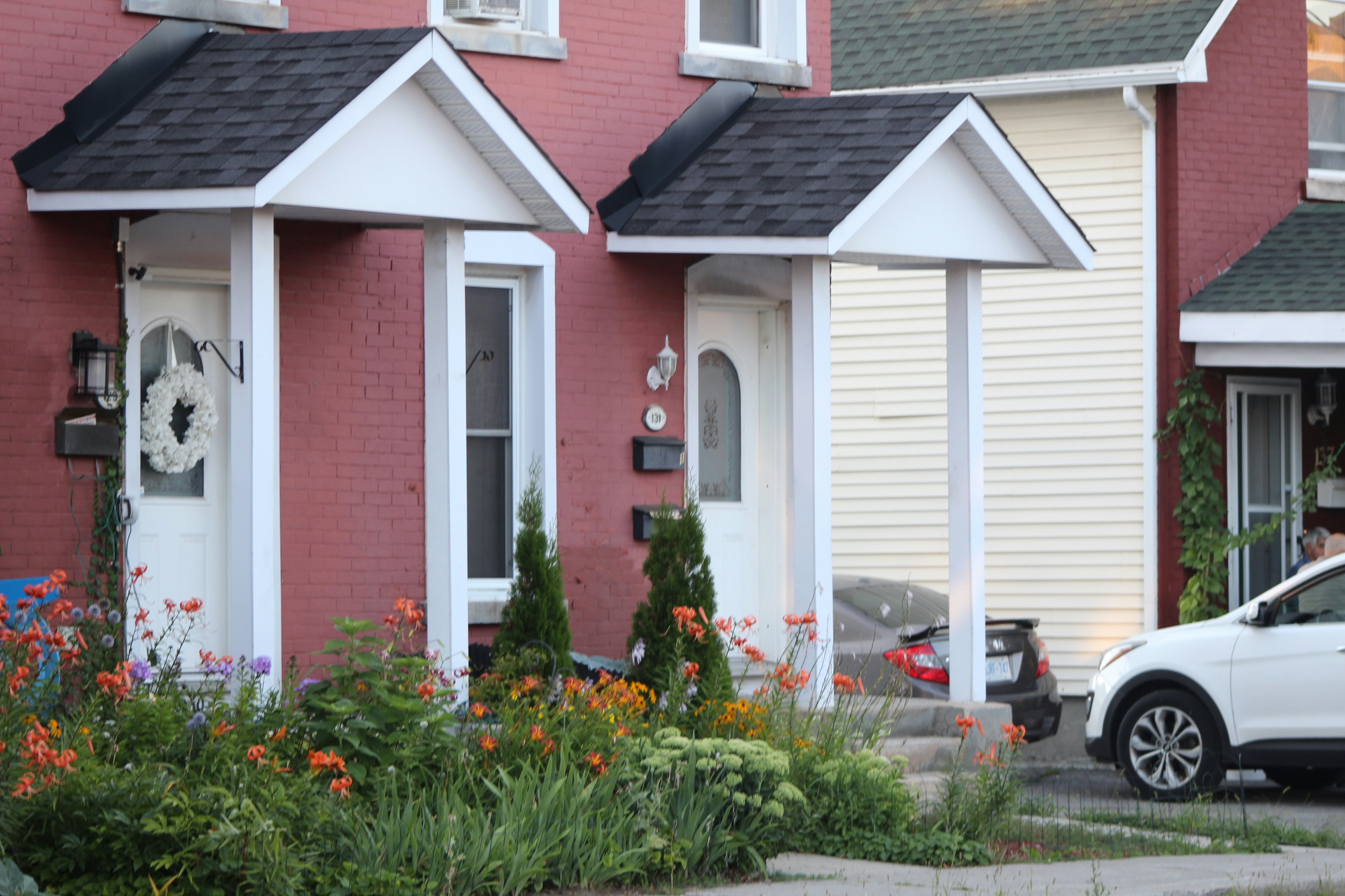 Pastel Row Home Front Garden Bloom