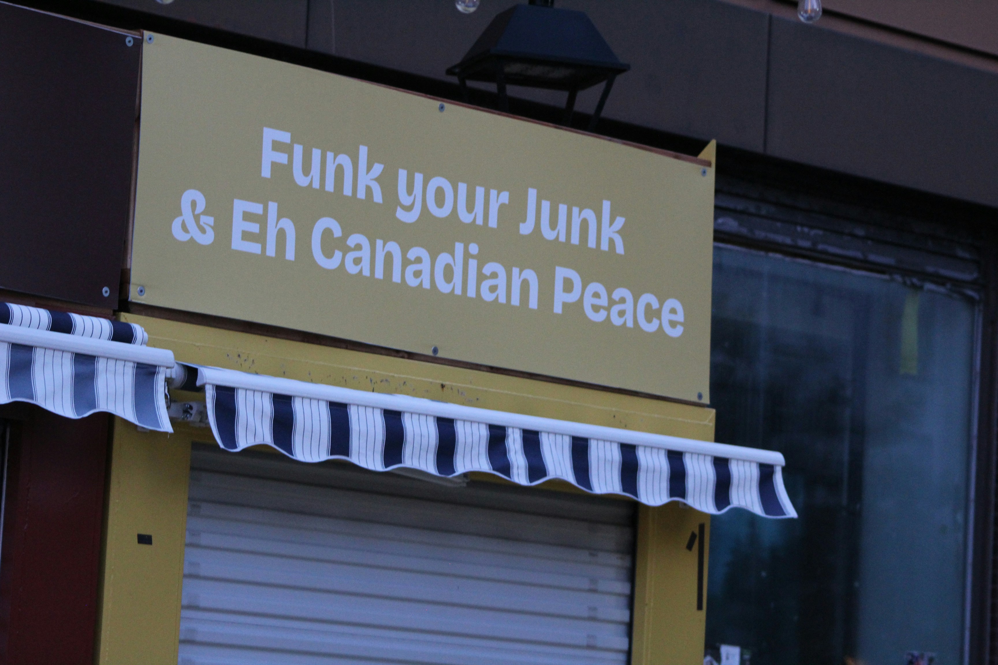 Signboard Sutra: Funk Your Junk & Eh Canadian Peace