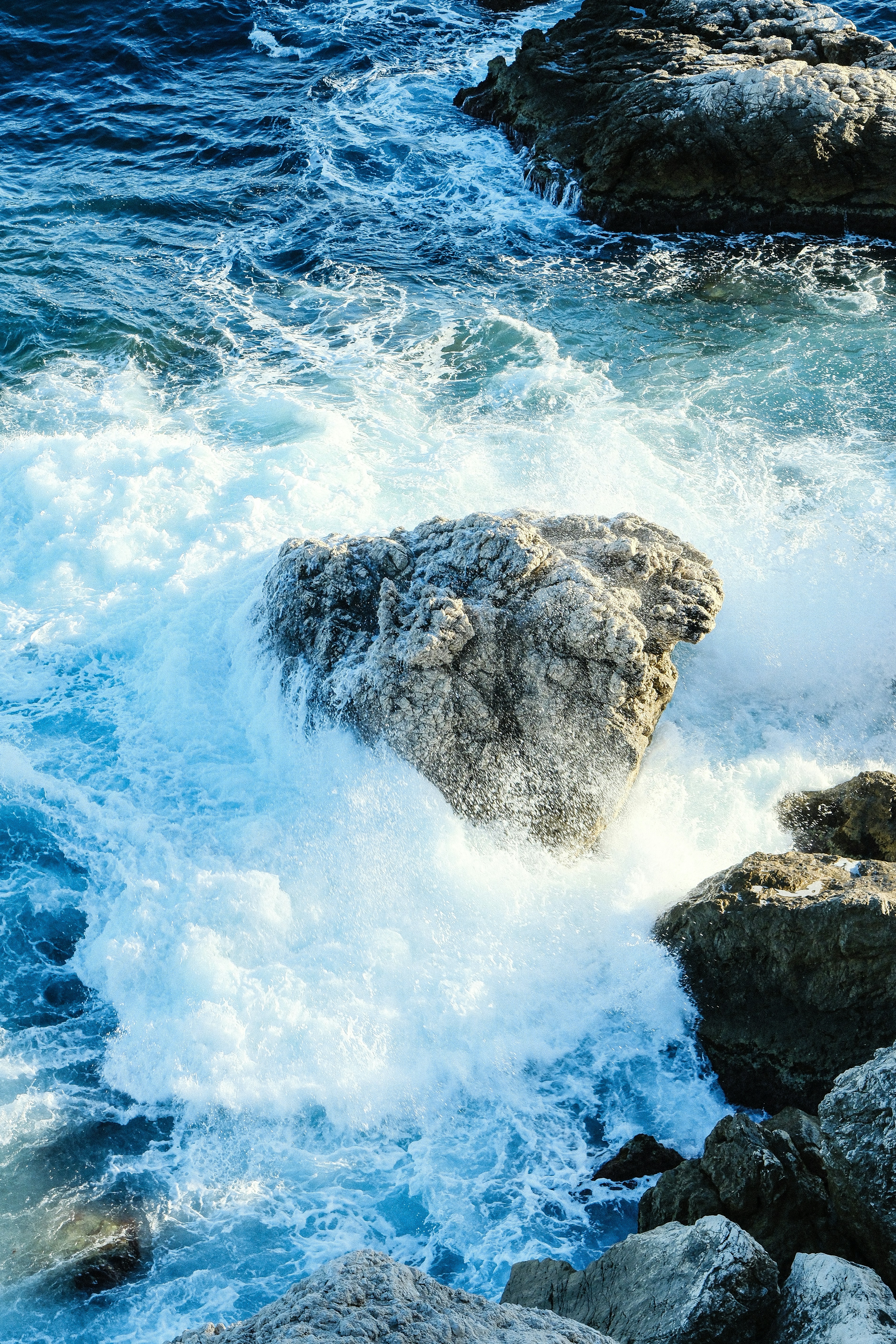 Sea Crown: A Crag Surrounded by Dancing Whitecaps