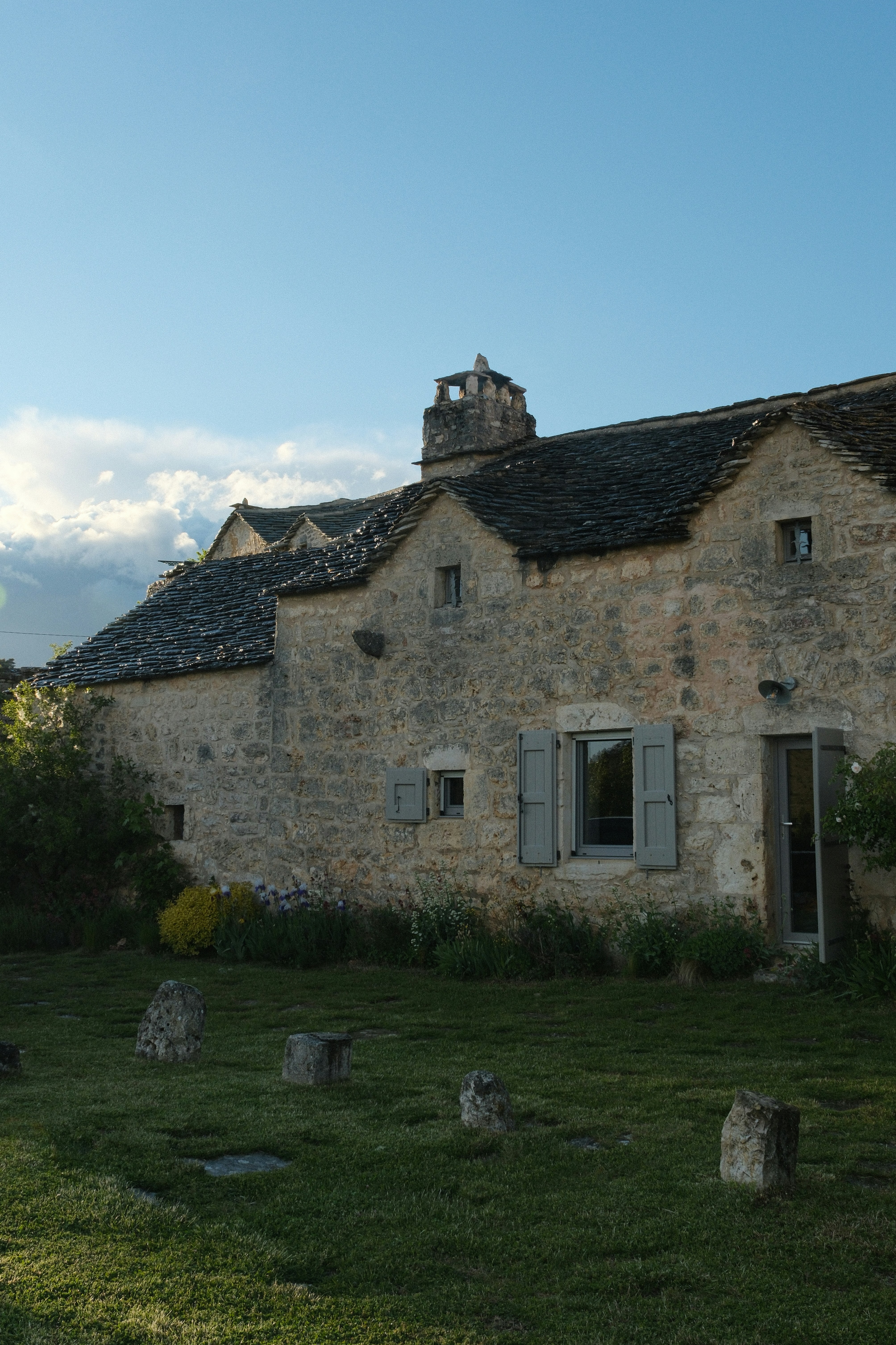 Stone Cottage Under a Clear Sky