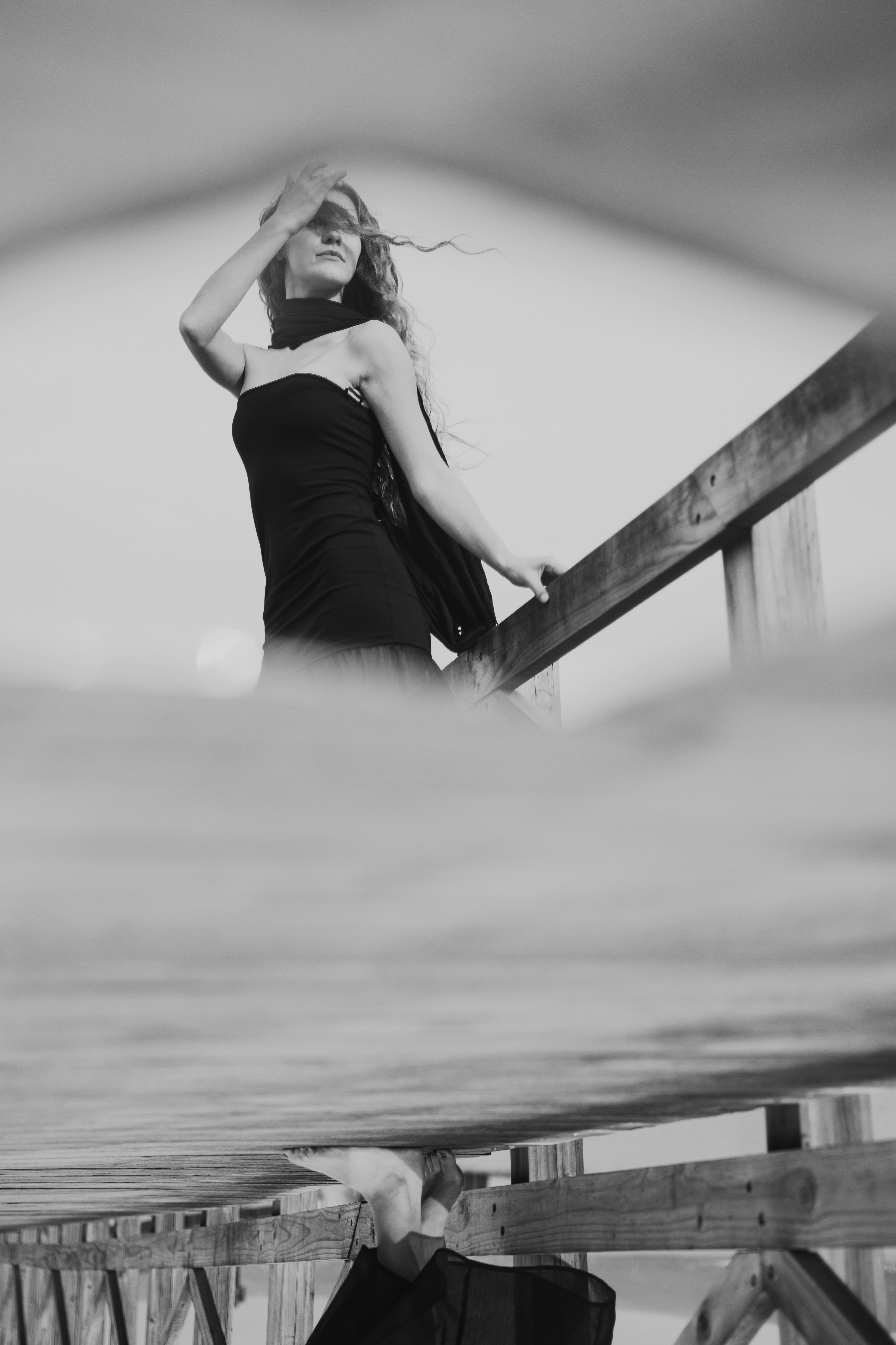 Gaze Across a Wooden Span: Portrait on the Edge of Wind