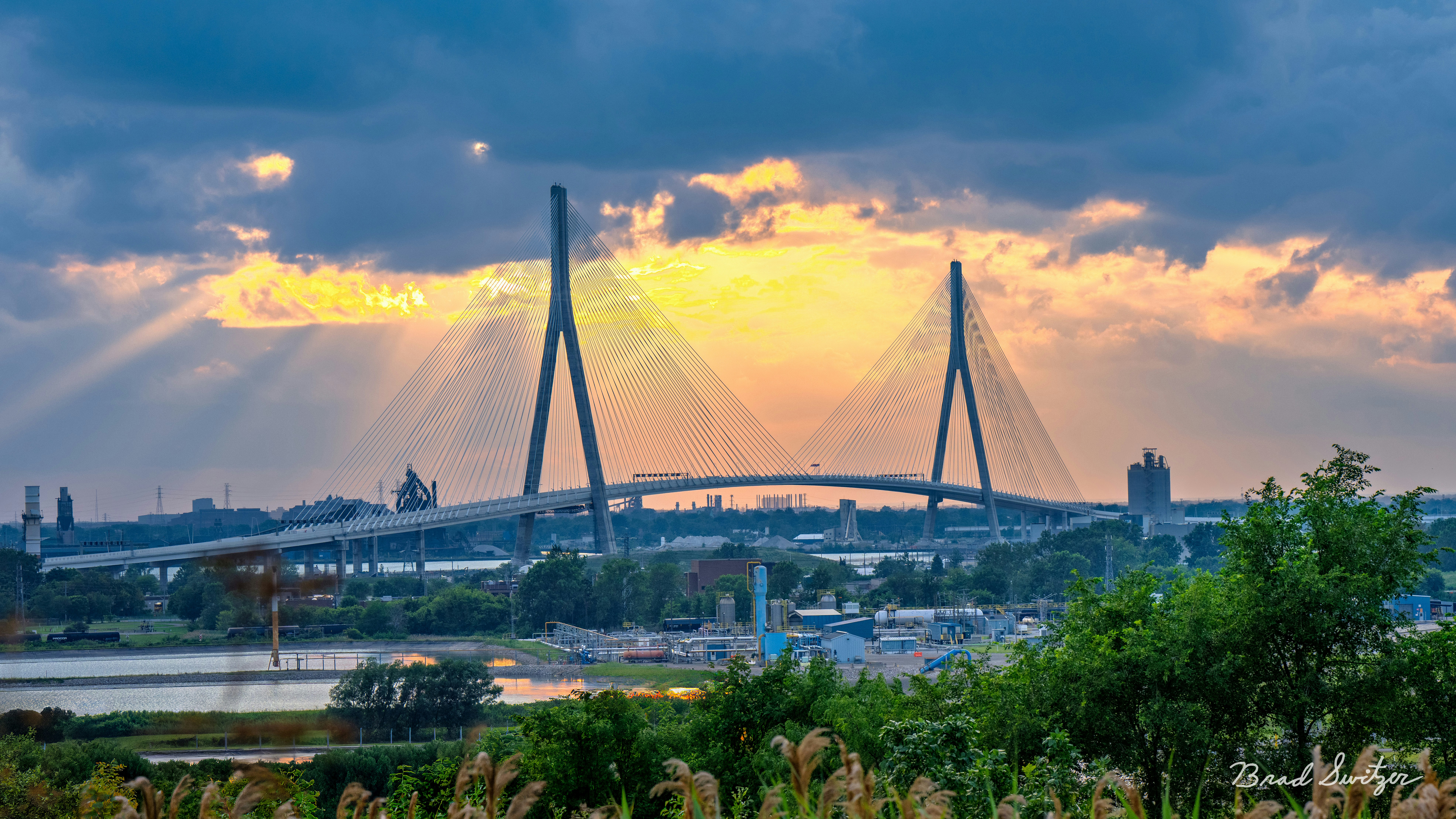 Sky-Bridge Dawn: A Suspended Icon Over the River Bend