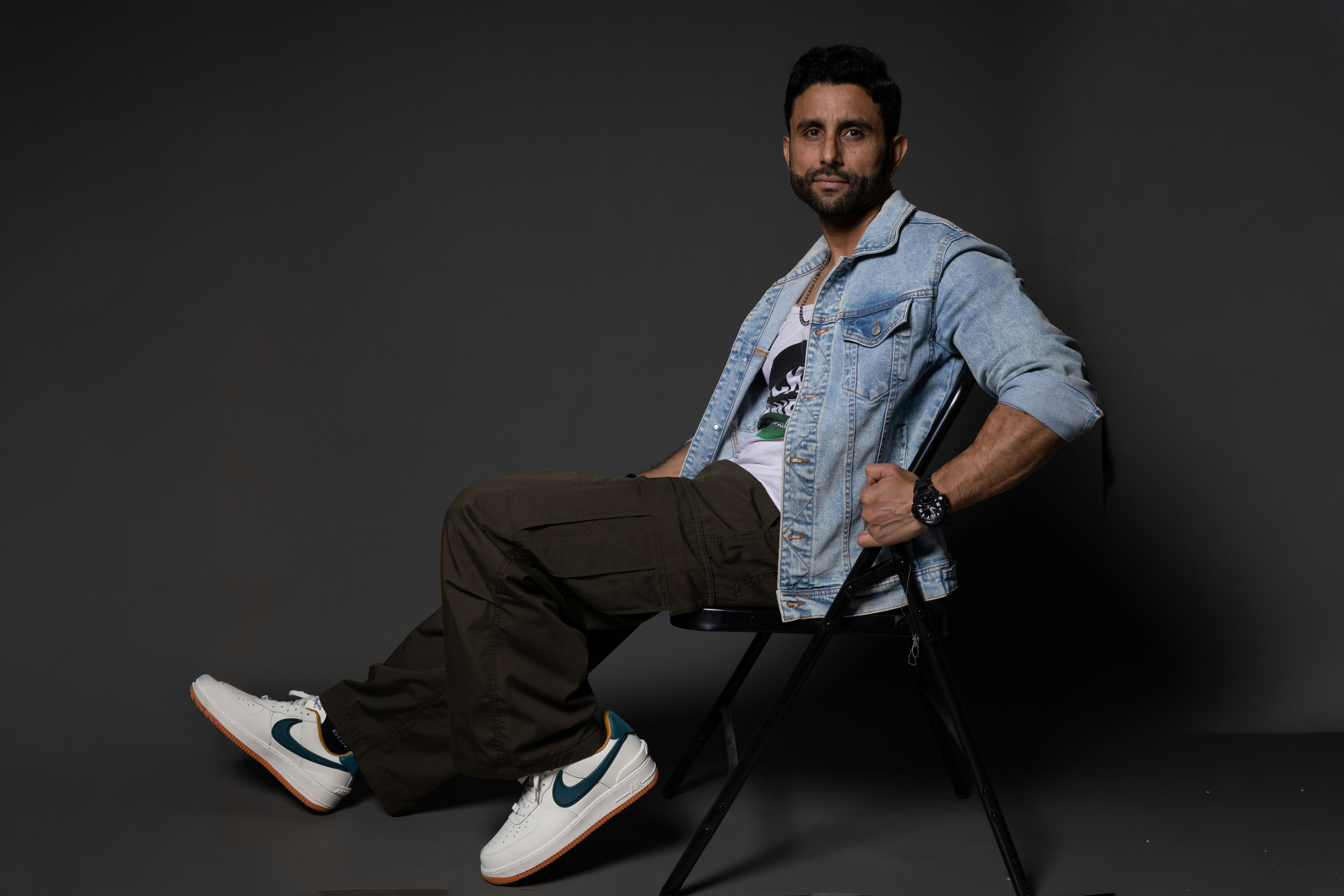 Casual Confidence: A Studio portrait in denim and sneakers