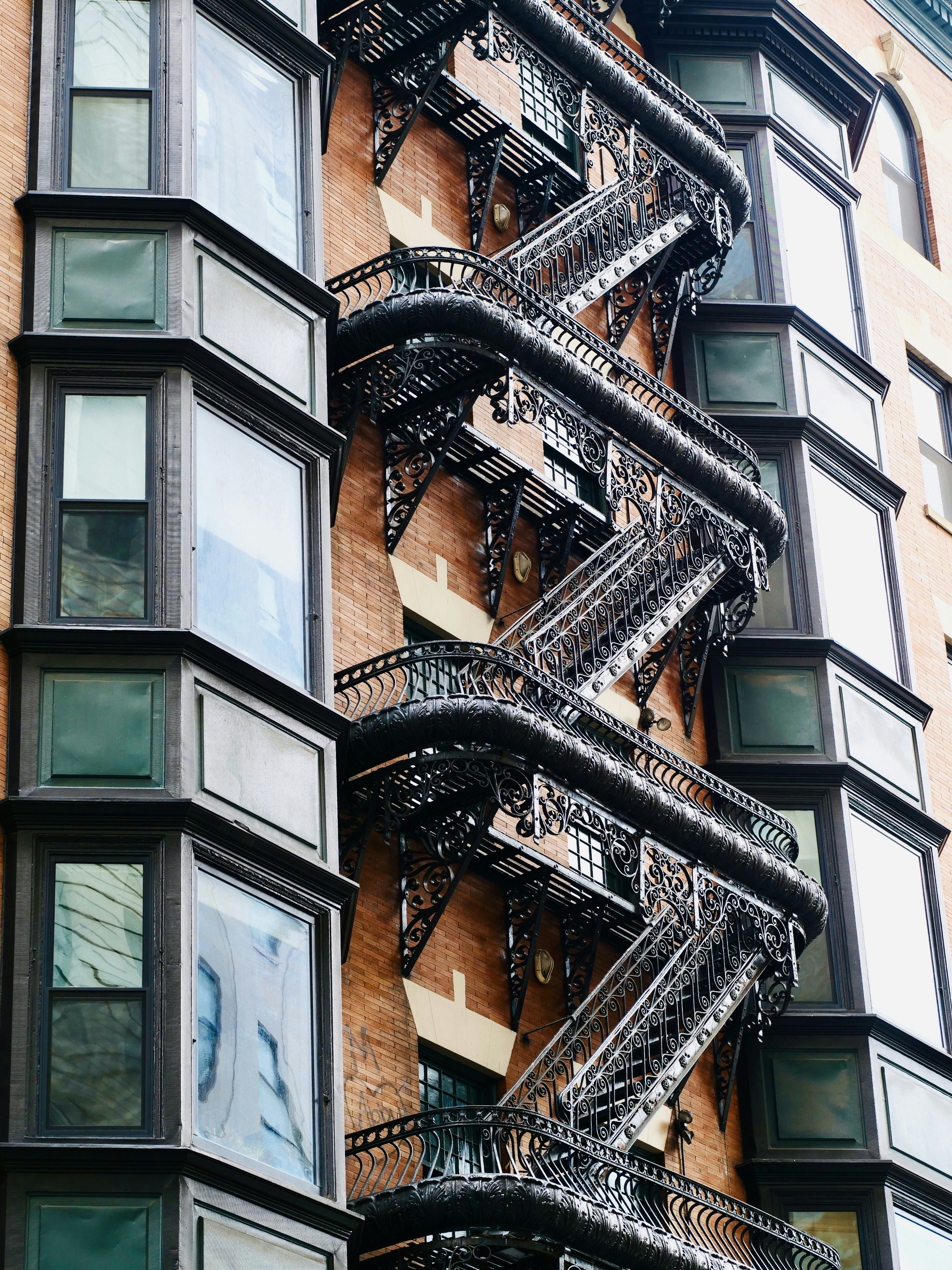 Fire-escape Rhythm: A Vertical Dance Along Brick and Glass
