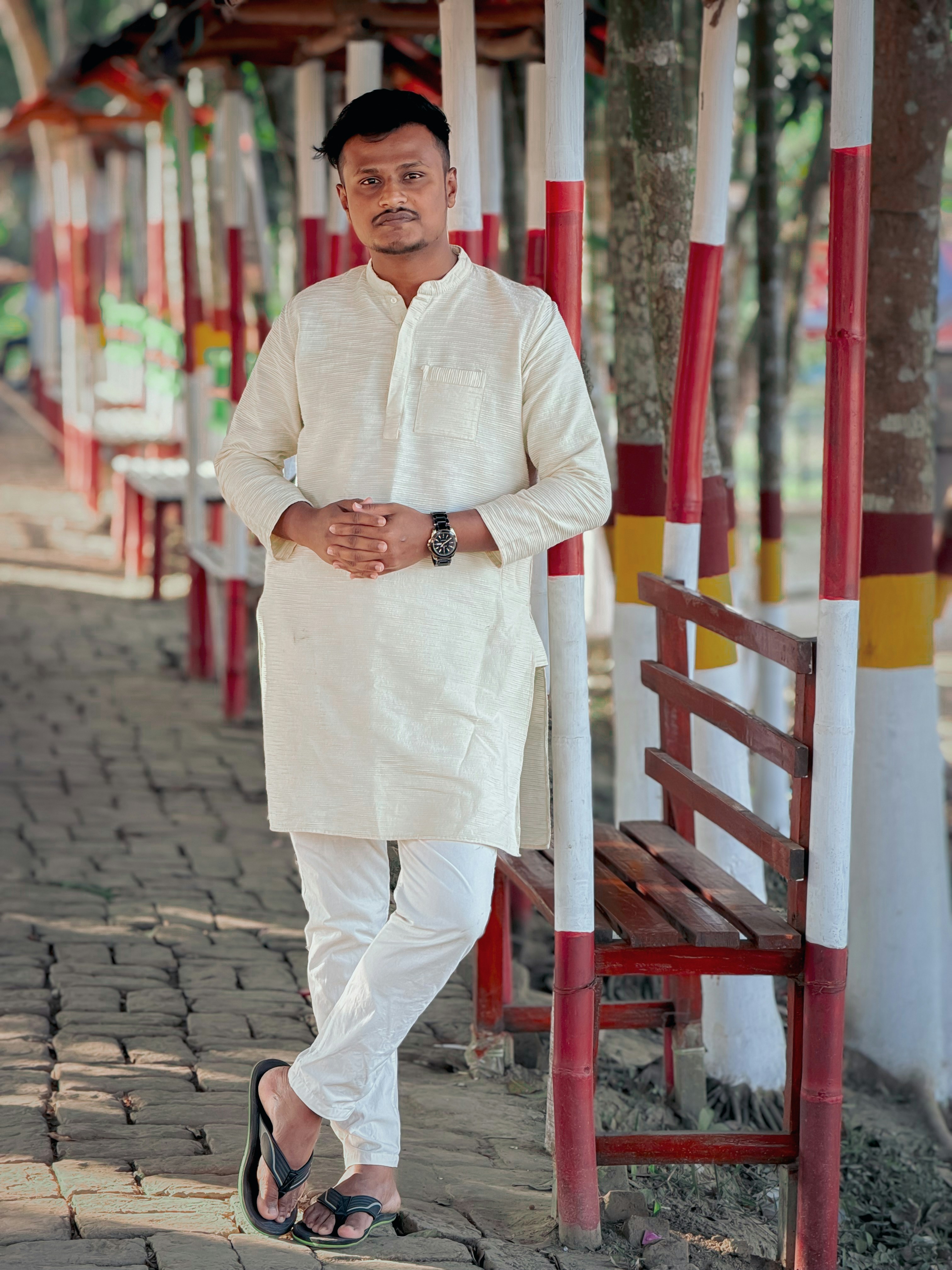 Quiet Confidence Under Painted Poles