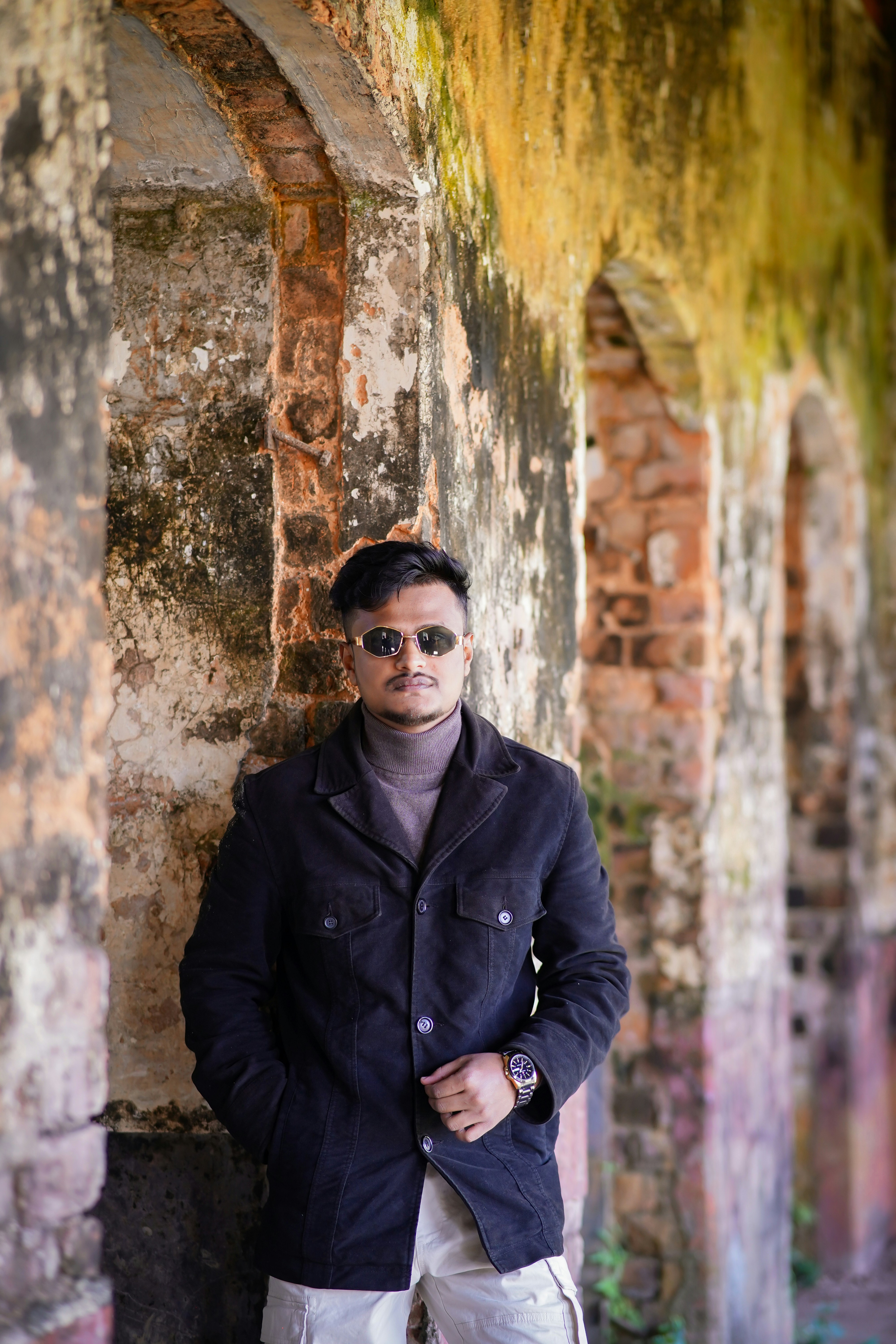 City-arcade Portrait: A Calm Gaze in Weathered Bricks
