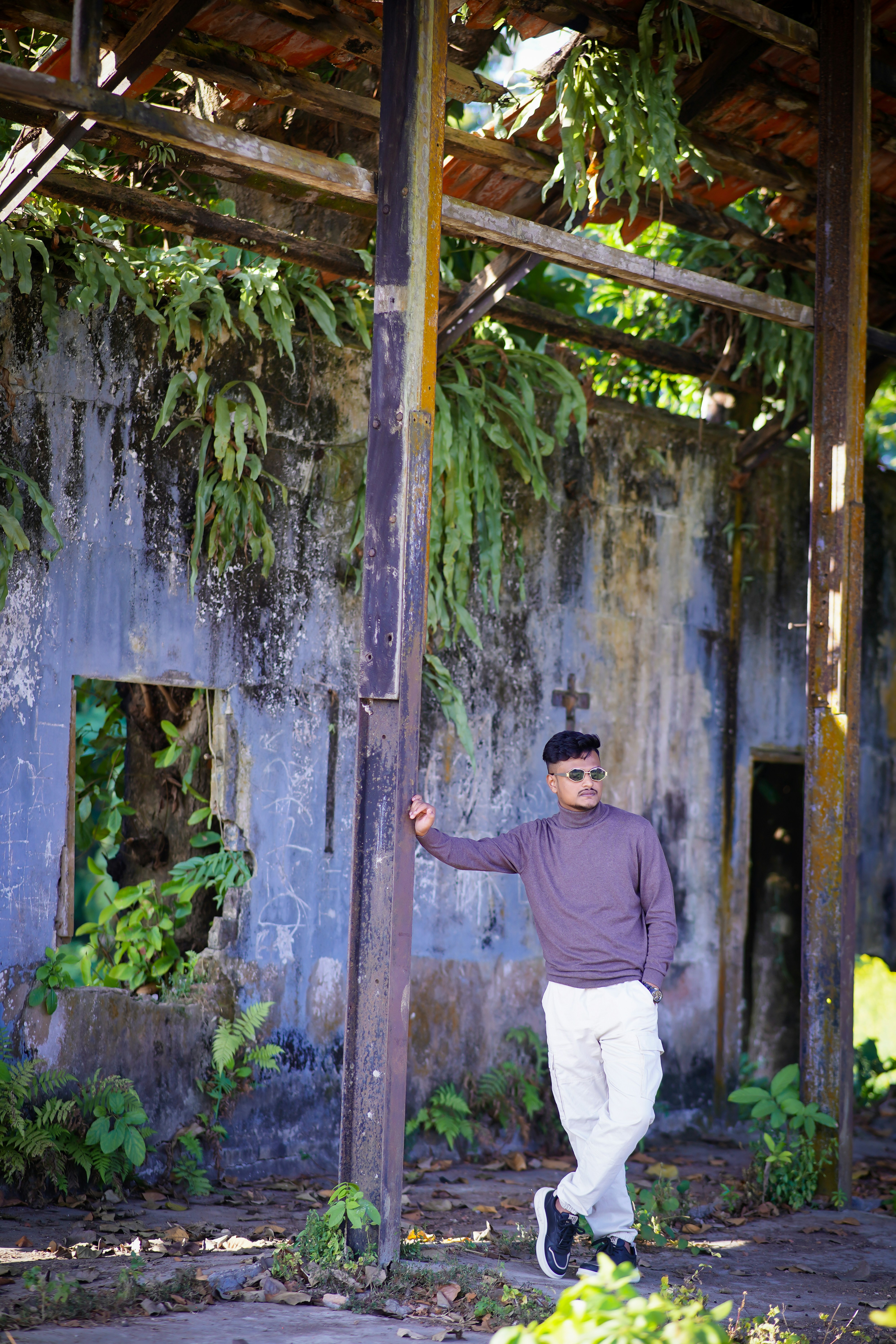 Urban Ruin Portrait: A Quiet Moment Among Sturdy Timber and Ferns