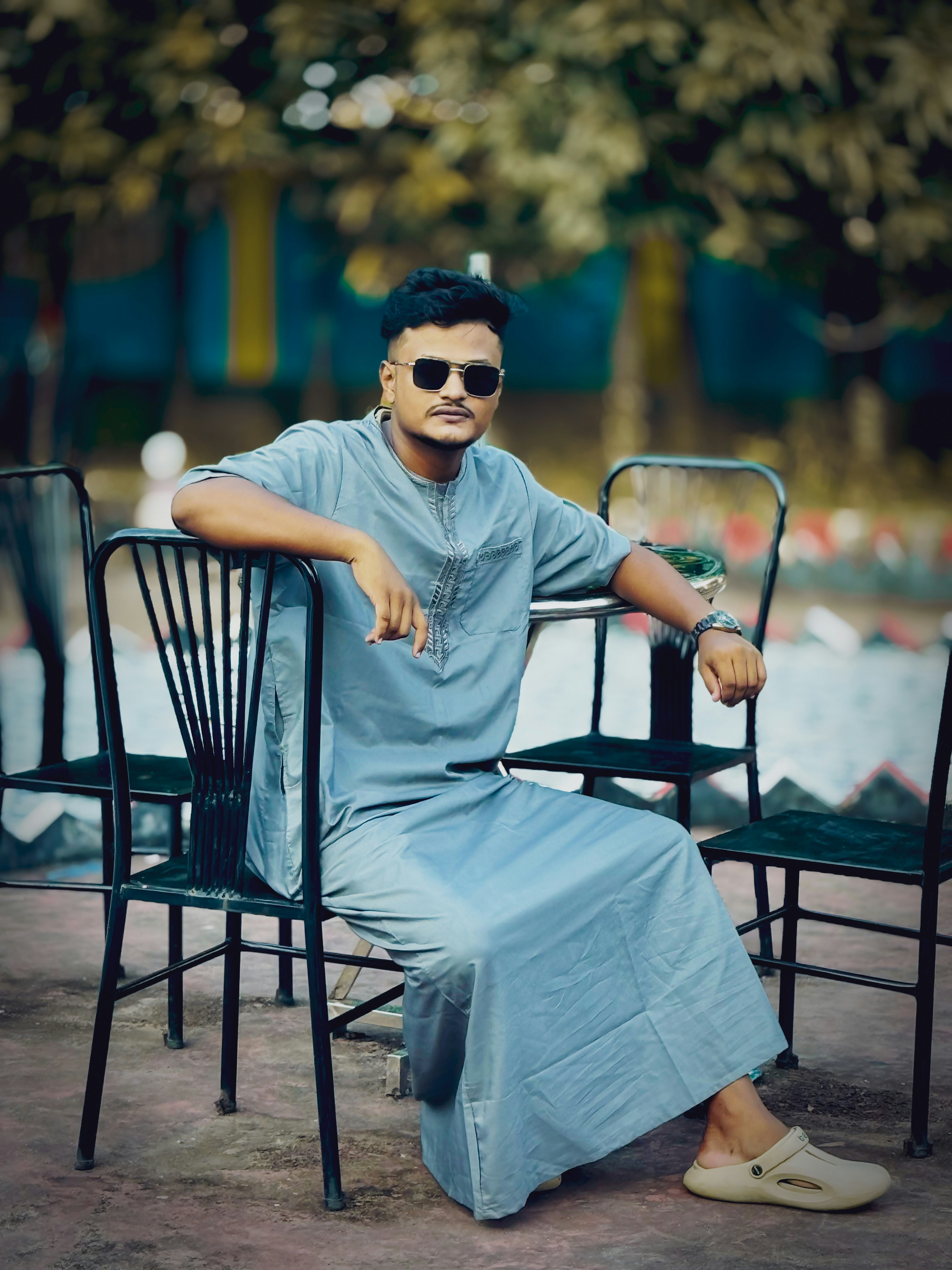 Chill Pose by the Water: A Modern Gentleman's Retreat