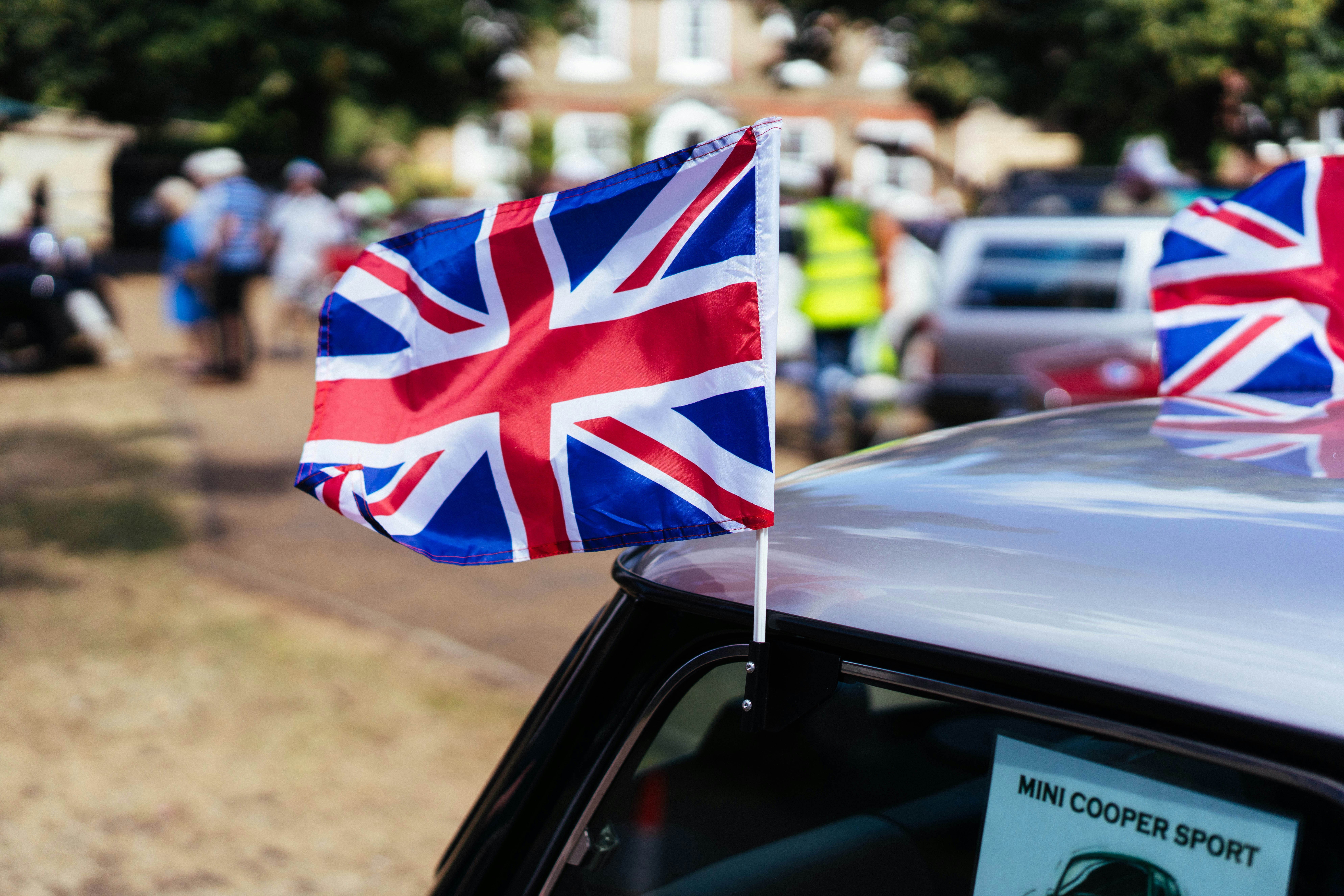 UK Flags on a Classic Car at a Public Event