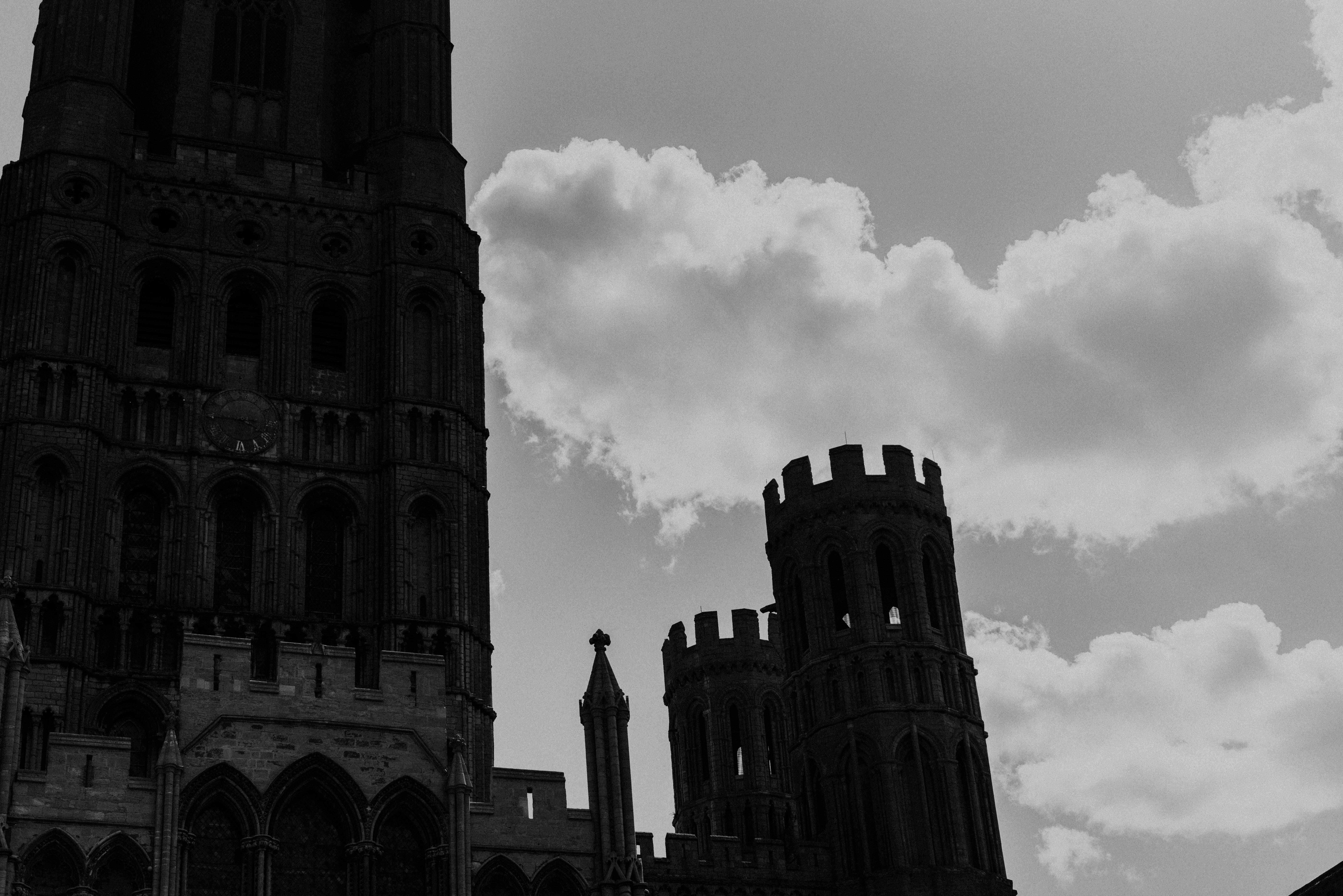 Castellated Silhouettes: Towers Against a Quivering Sky