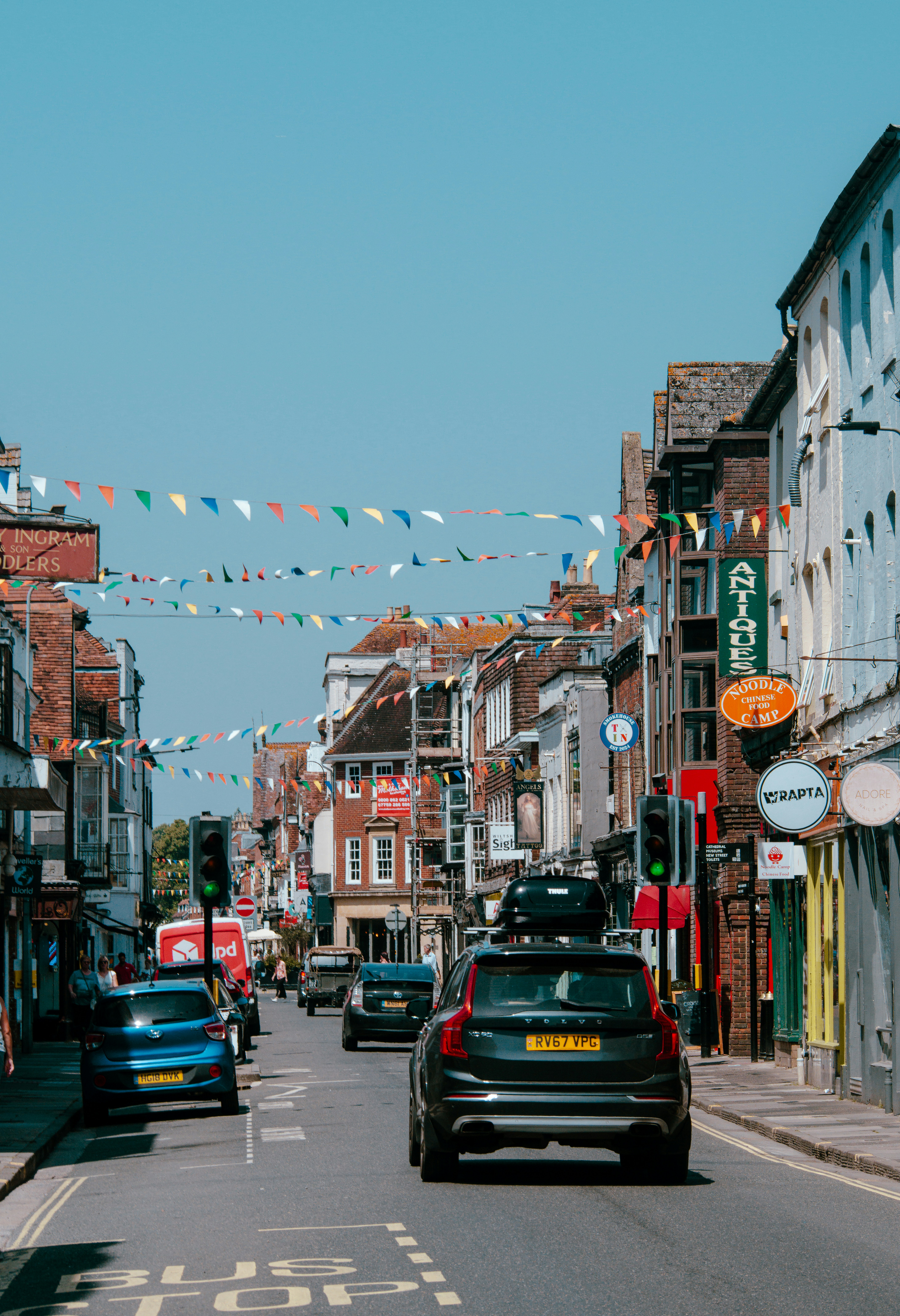 Colorful Street Corridor Under Festive Flags