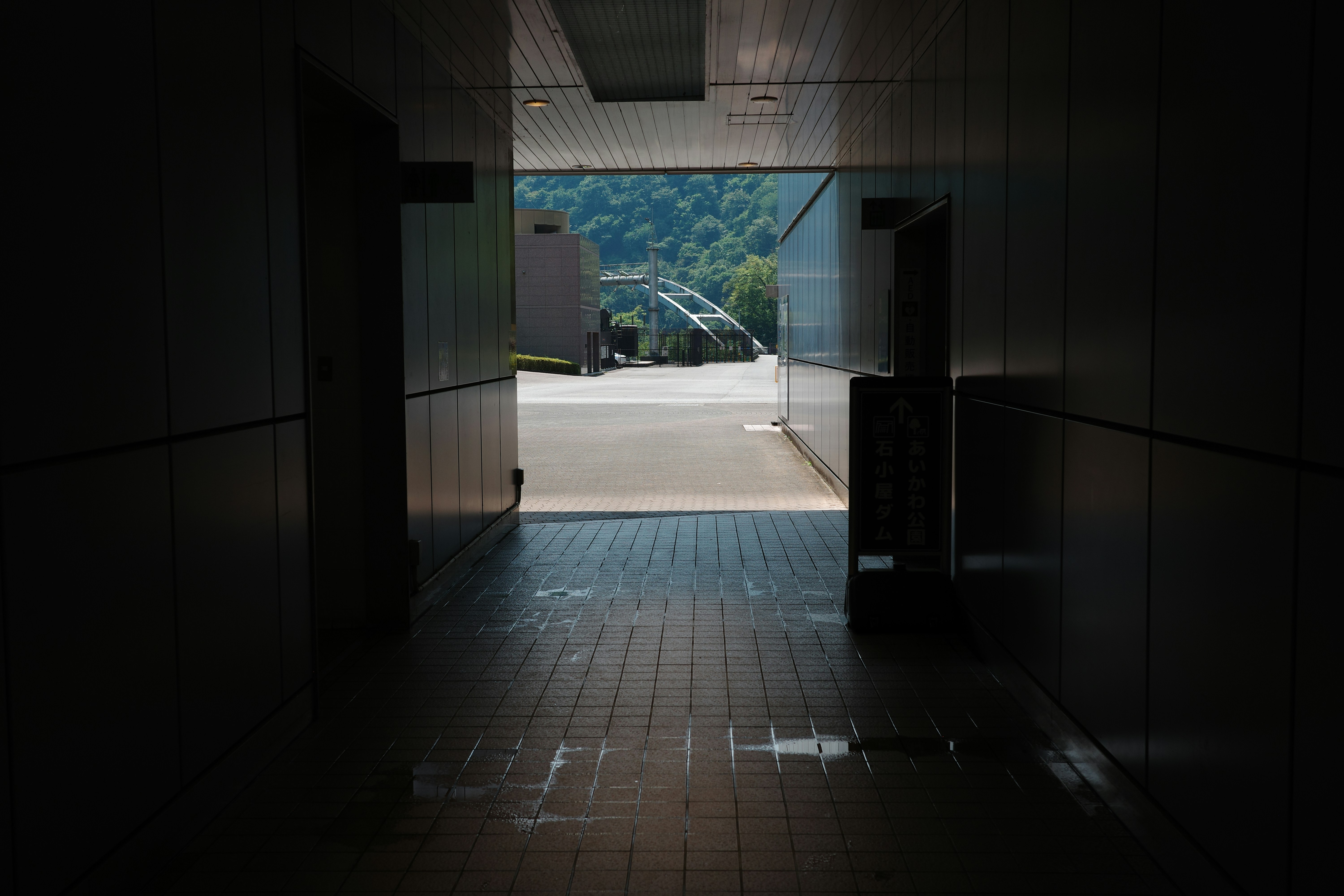 Light at the End of the Hall toward the Exterior Parking