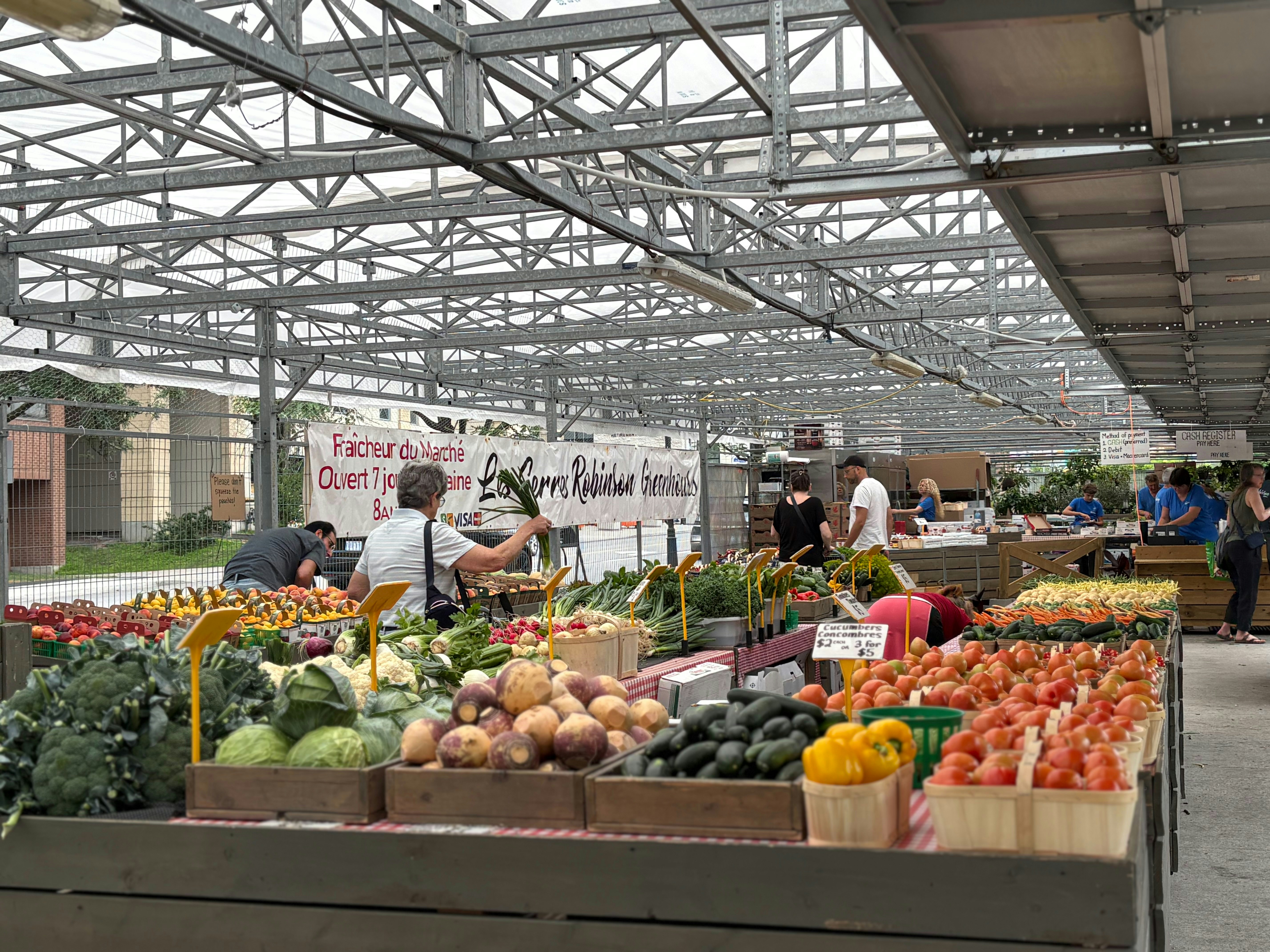 Fresh Produce Haven Under a Glass Canopy