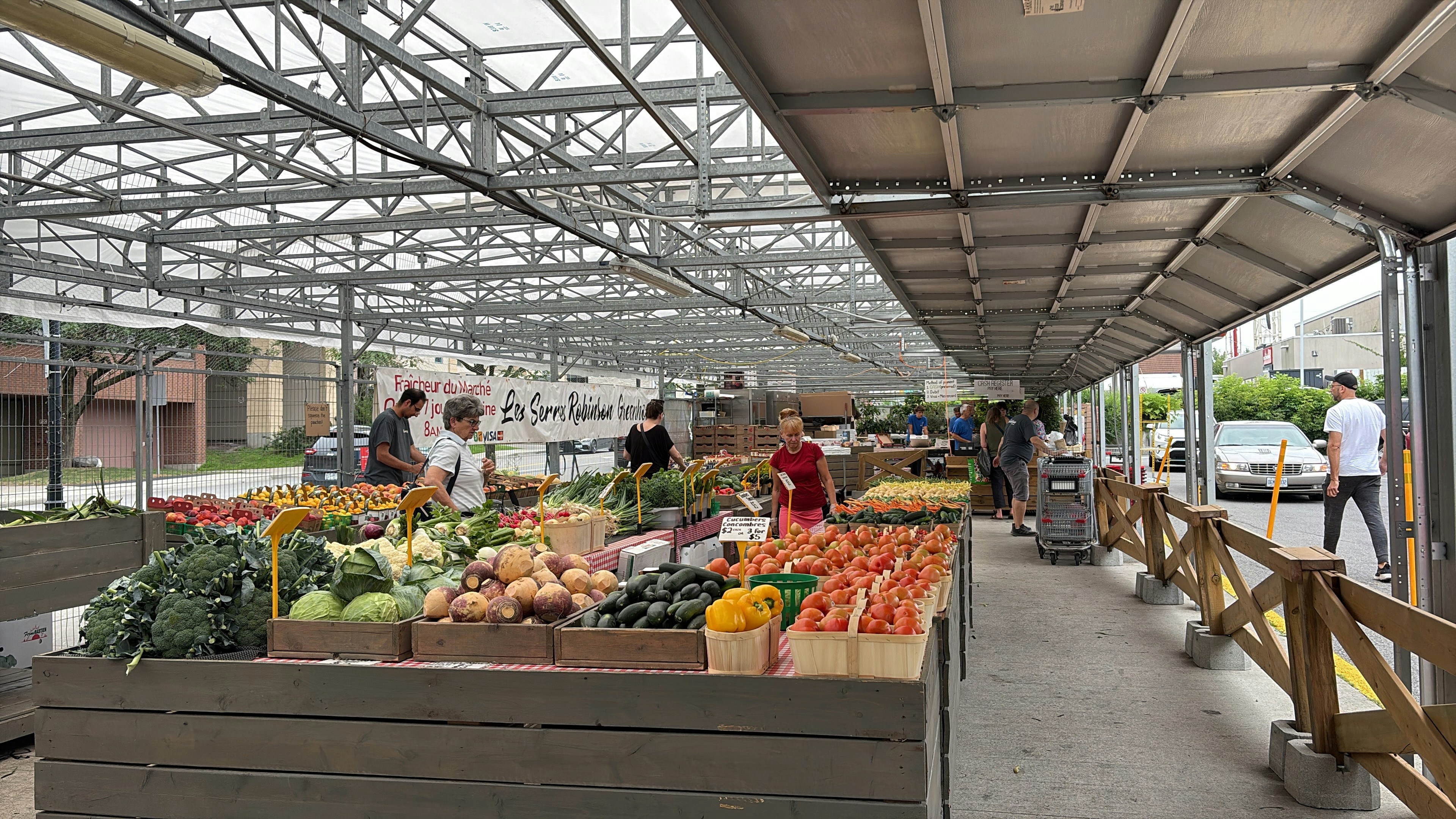 Market Stalls under a Glass Canopy in Soft Daylight