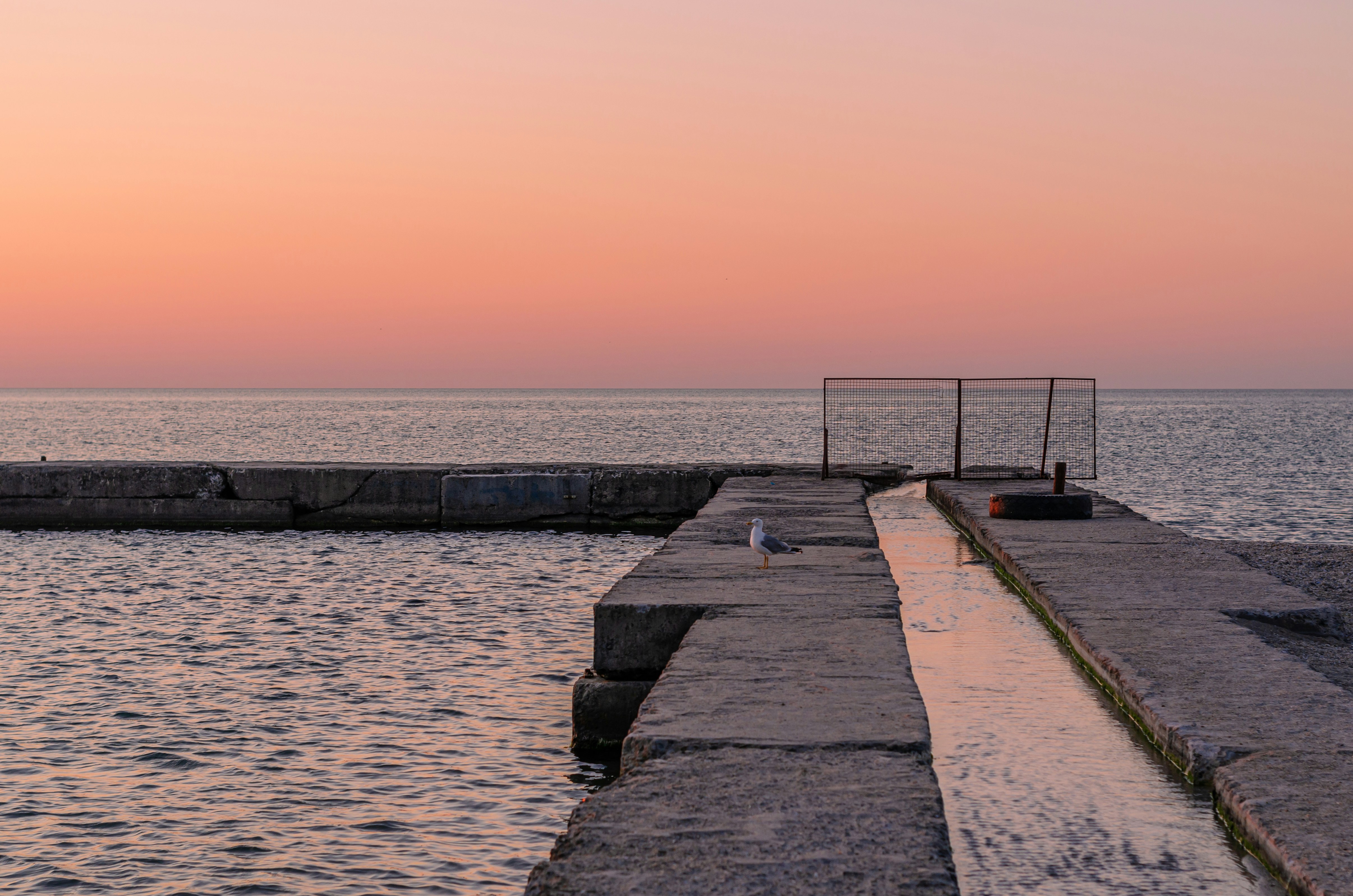 Sunset Pier: Calm Waters Meet a Quiet Platform