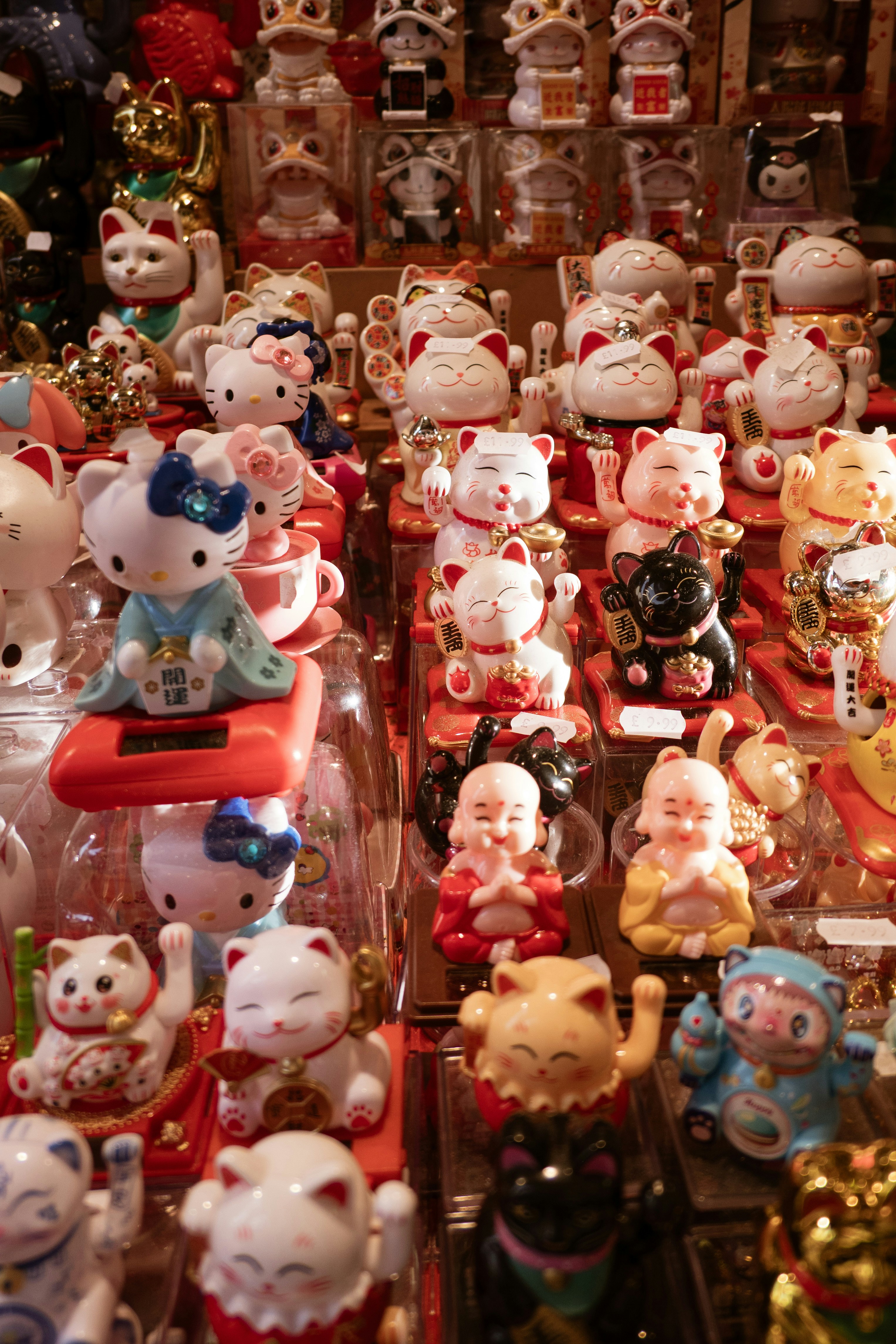 Benevolent Cat Parade: A Carousel of Lucky Maneki-Neko Figurines