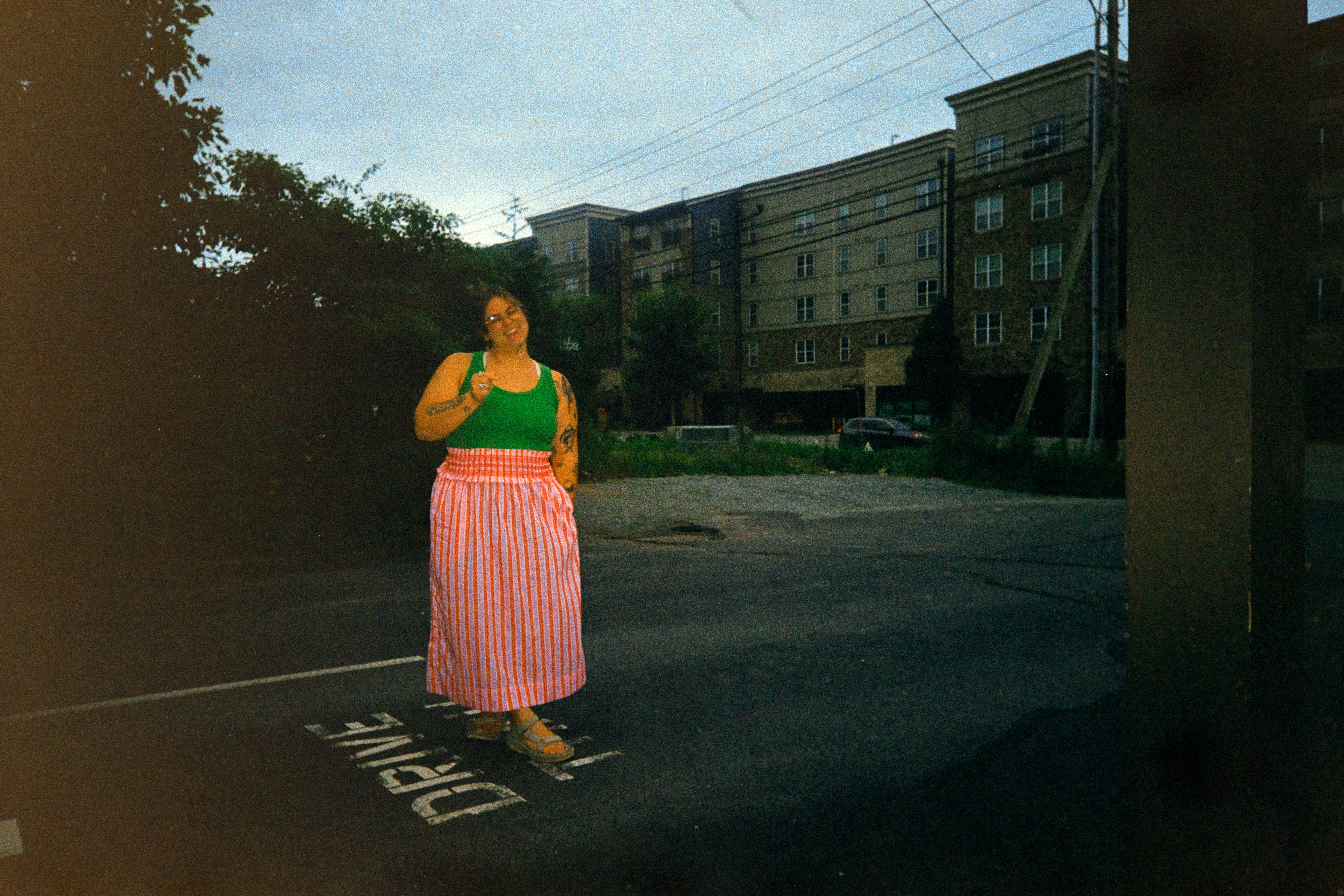 Sunlit Stylist in a Weathered Parking Lot