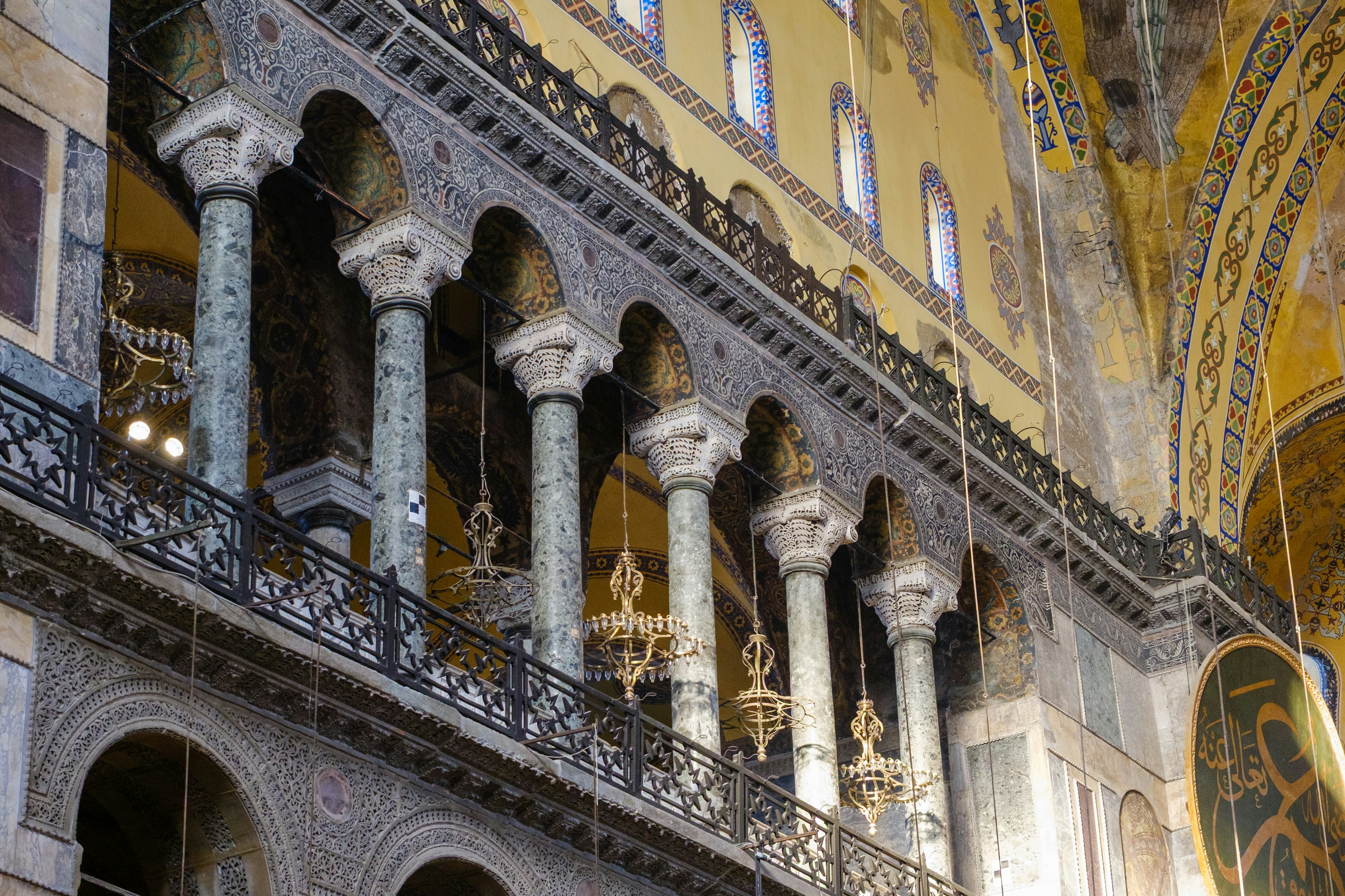 Harmonic arches and gilded details in a grand Byzantine hall
