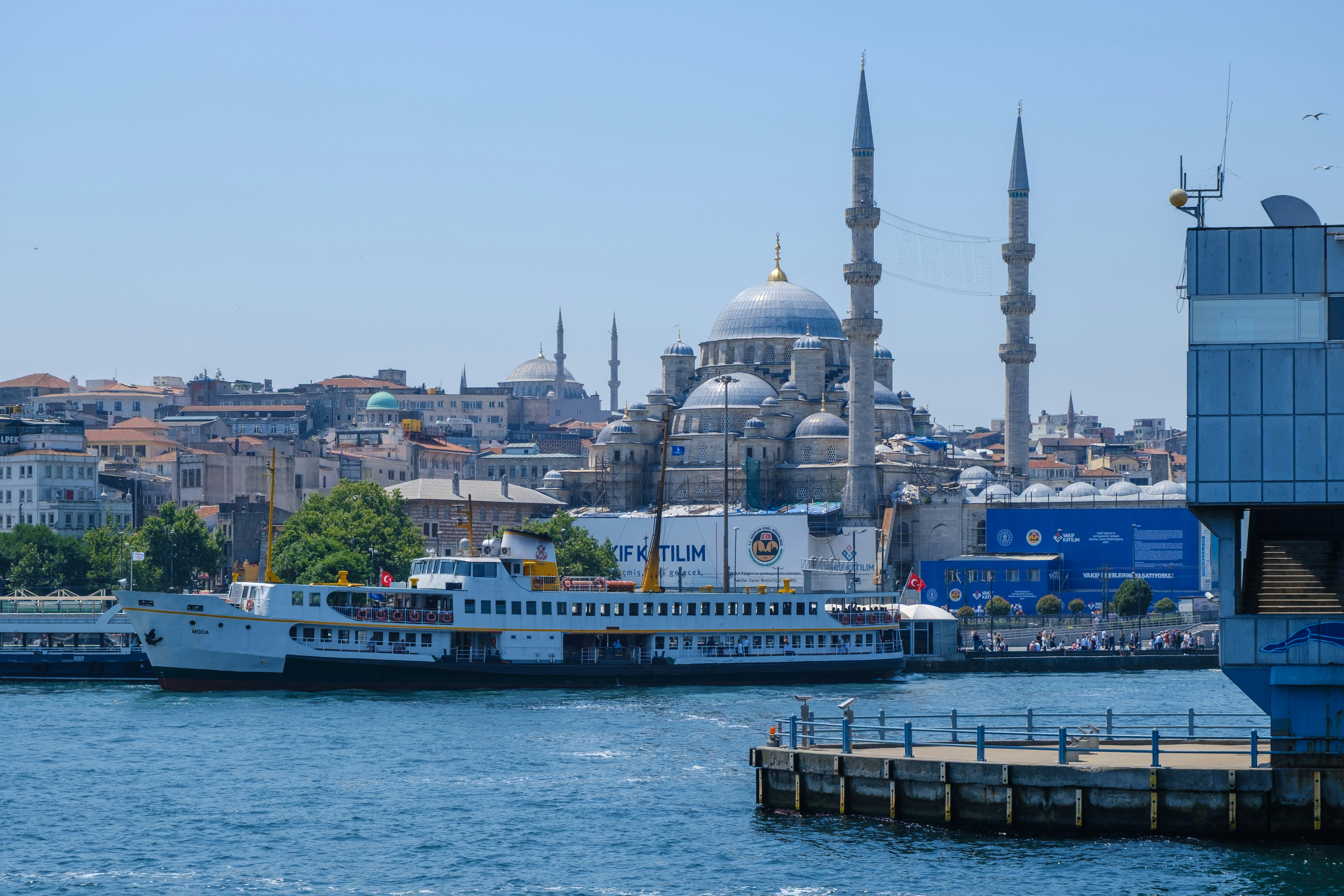 Harbor Mosque at Dusk: domes and minarets over calm waters