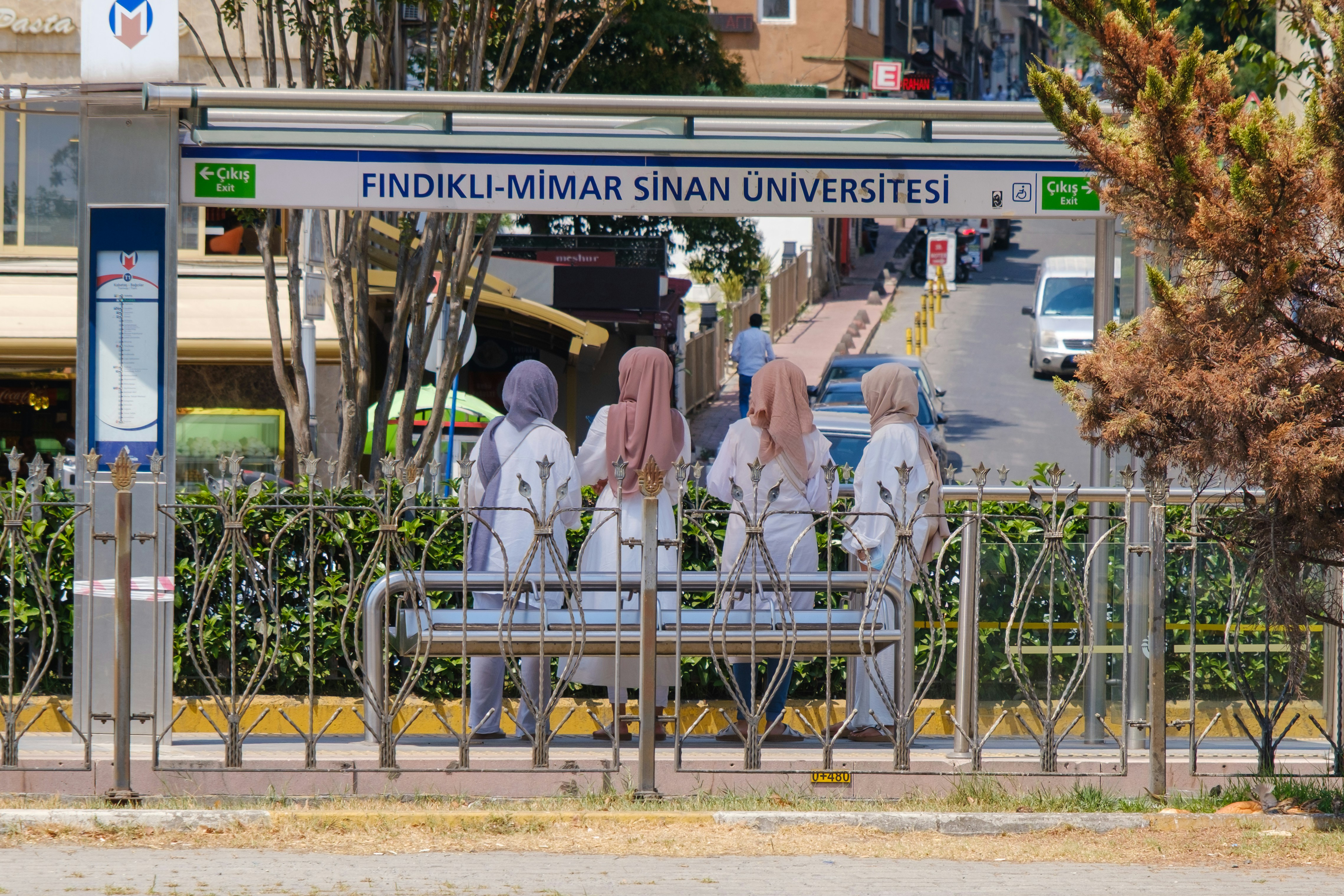 Eyes on the Campus Gate: Five Hijabi Students at the Entrance