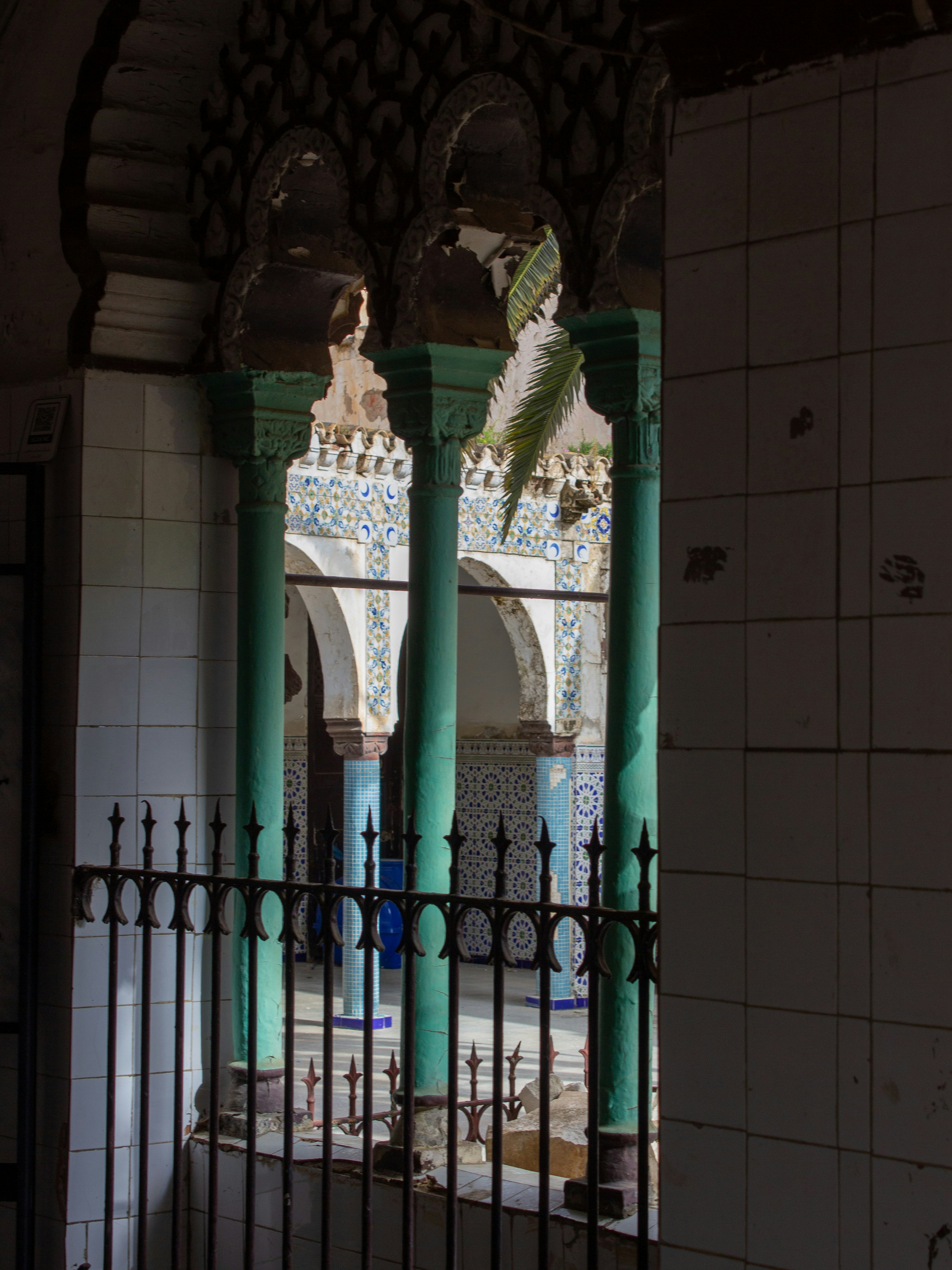 Green Columns Framing Sacred Archways