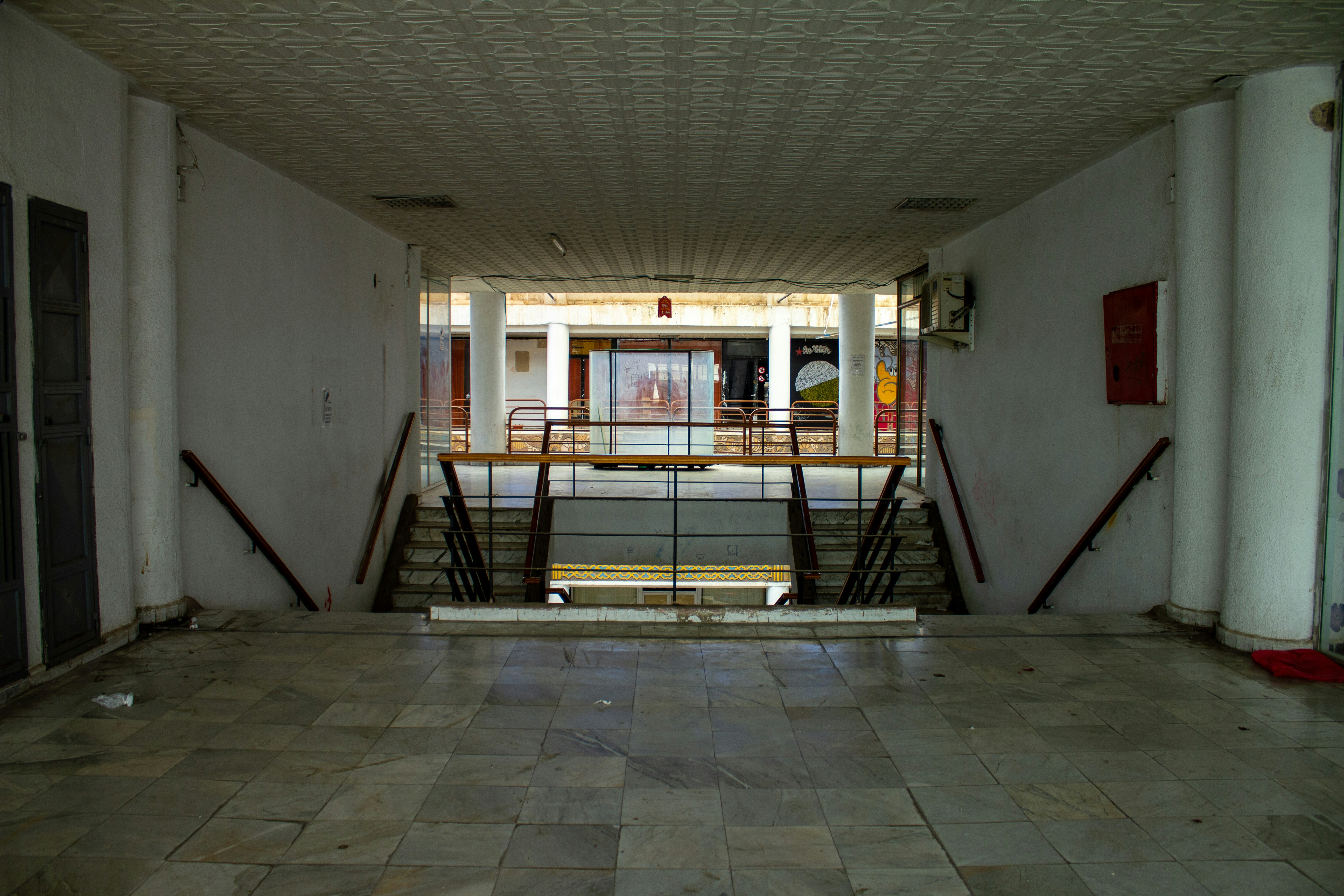 Deserted Atrium: Staircase to Quiet Geometry