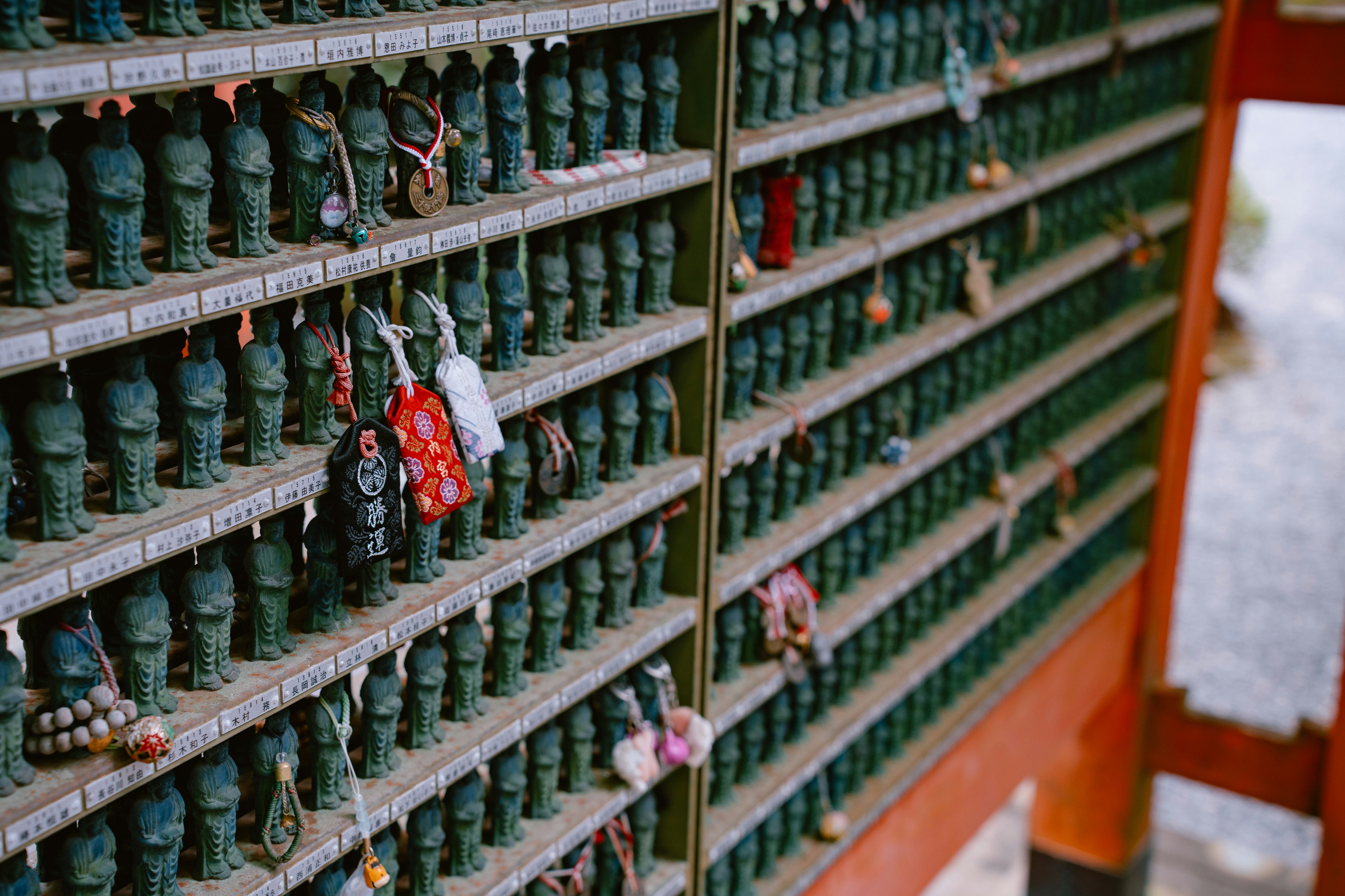 Locks and Lanterns: A Sea of Green Ornaments Along a Varied Shelf