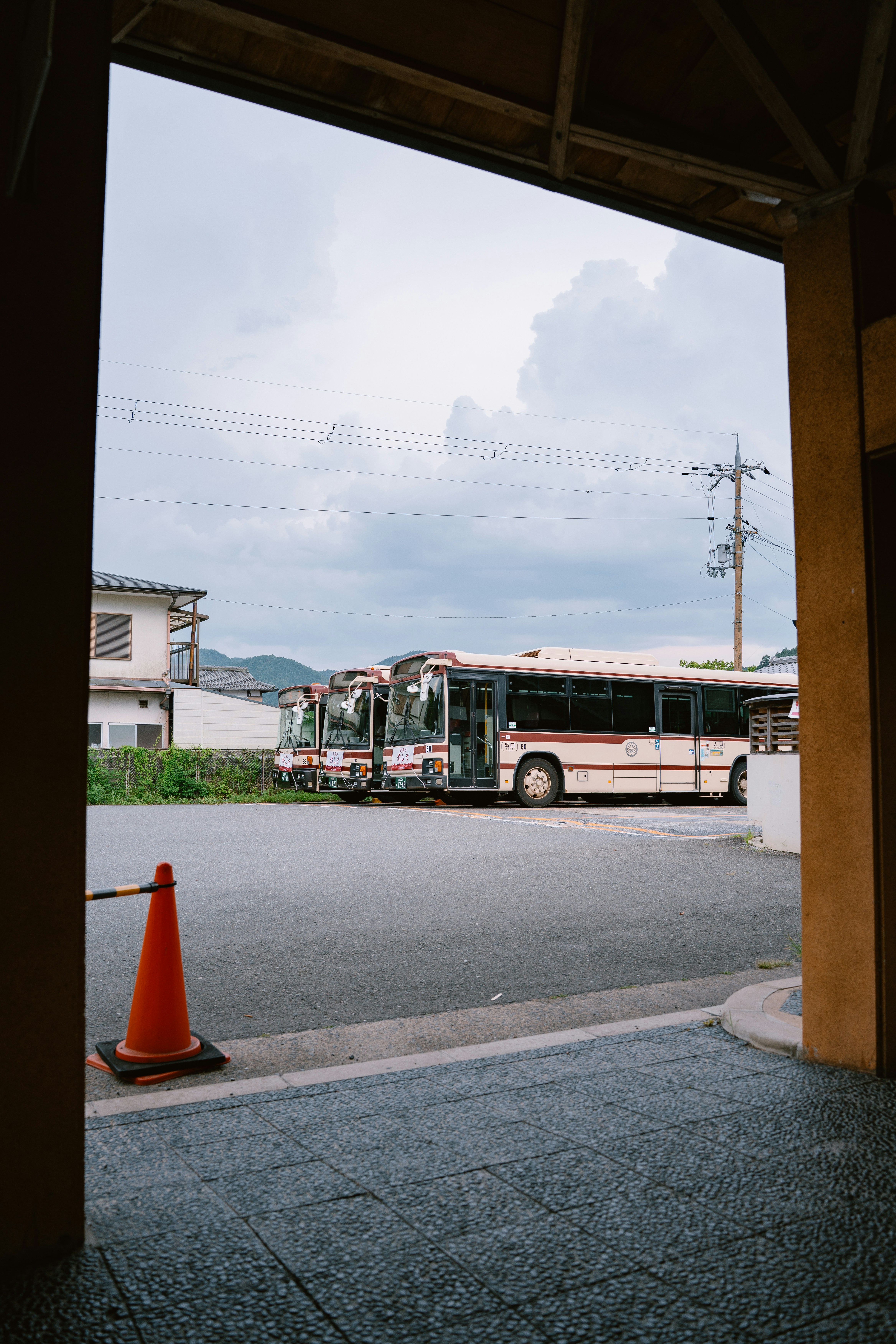 Bus Yard Through a Framed Arch