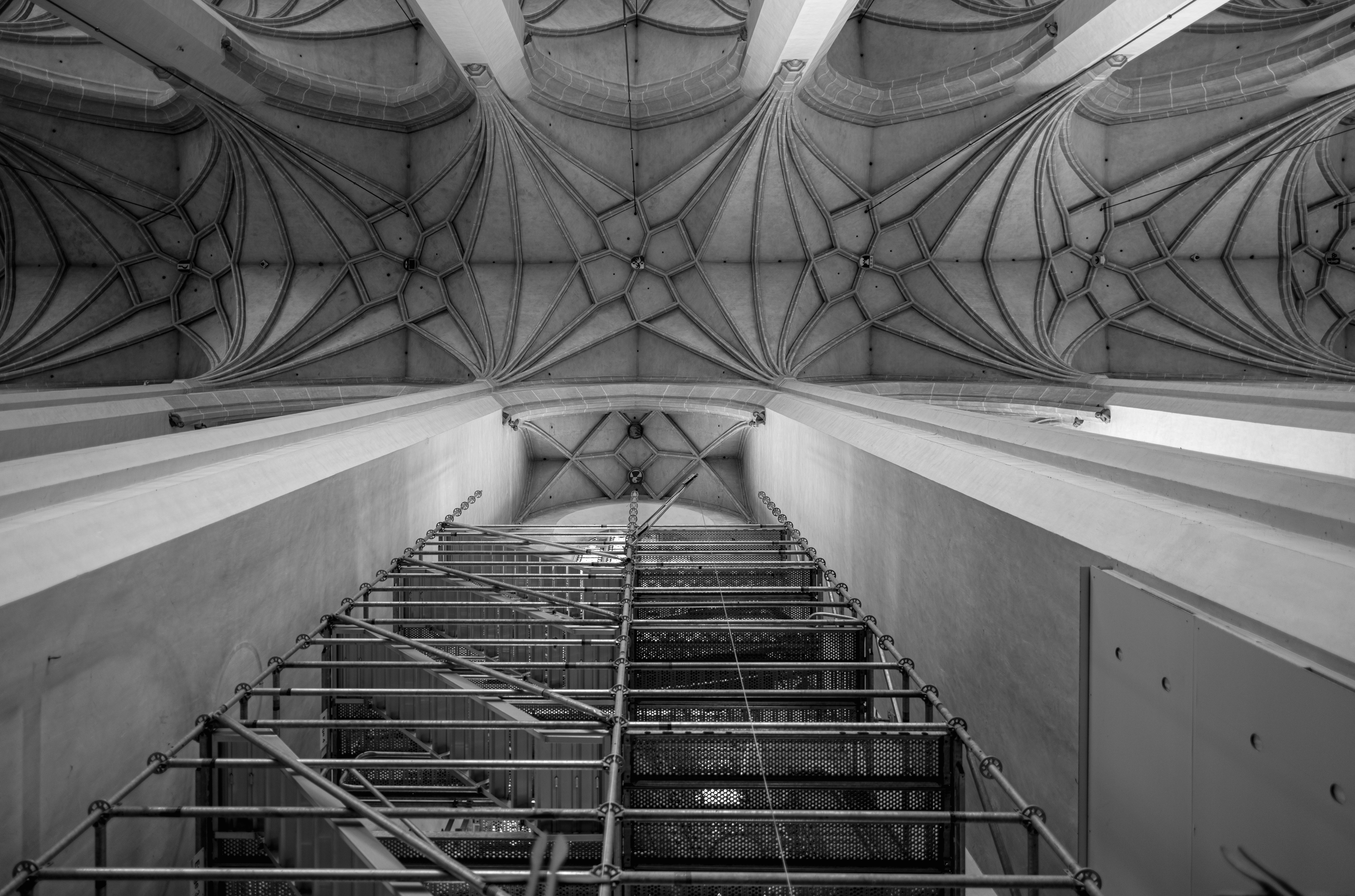 Architectural Echoes: A Symmetry-Driven Descent into Stone Vaults