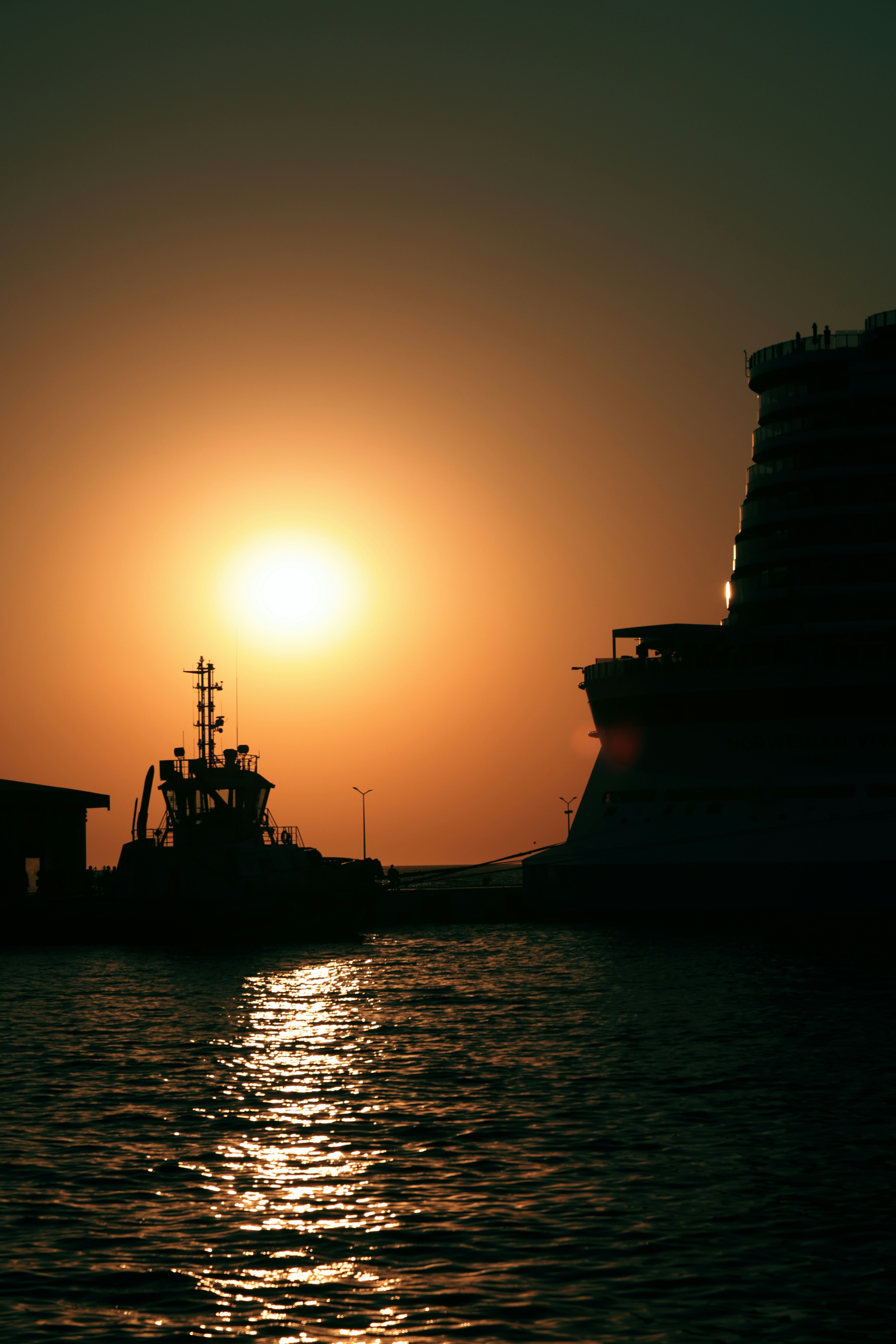 Sunlit Harbor Silhouette at Dusk