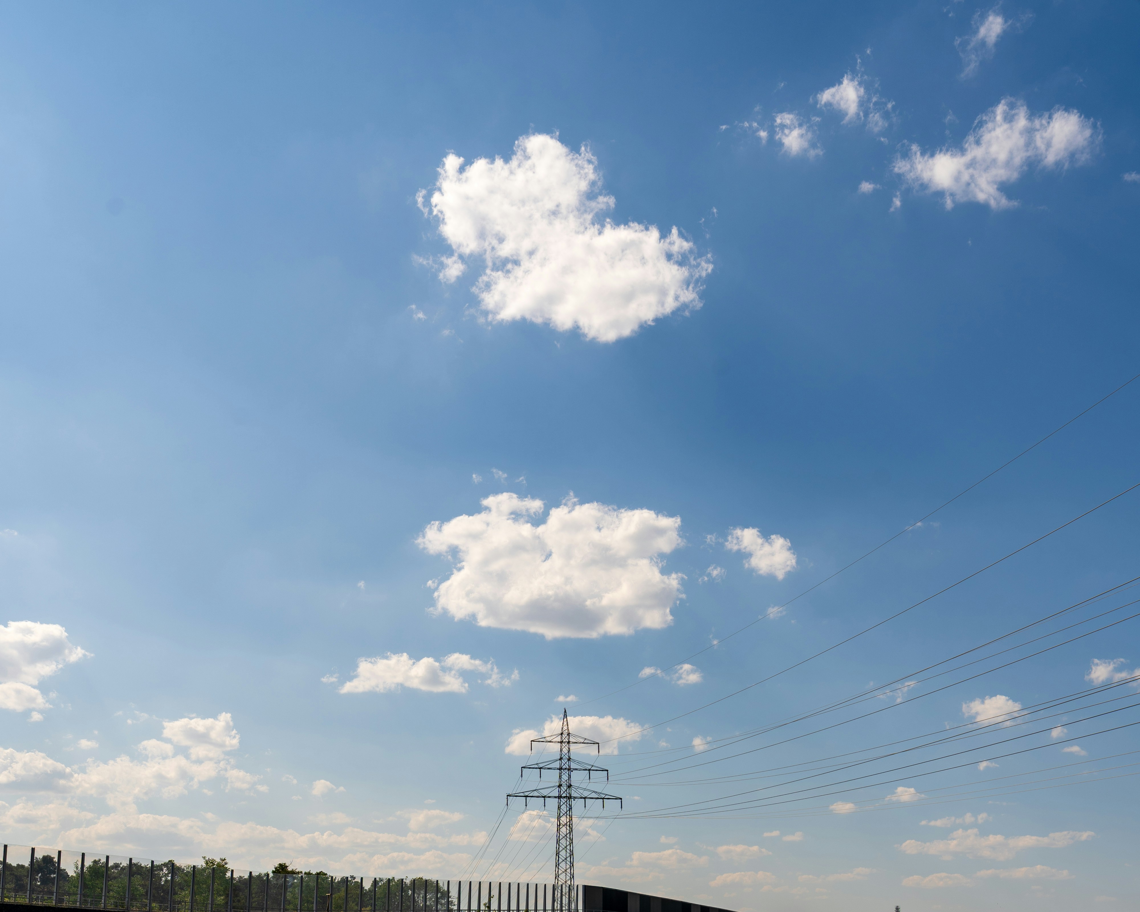 Clear Sky Over Power Lines: A Quiet Horizon