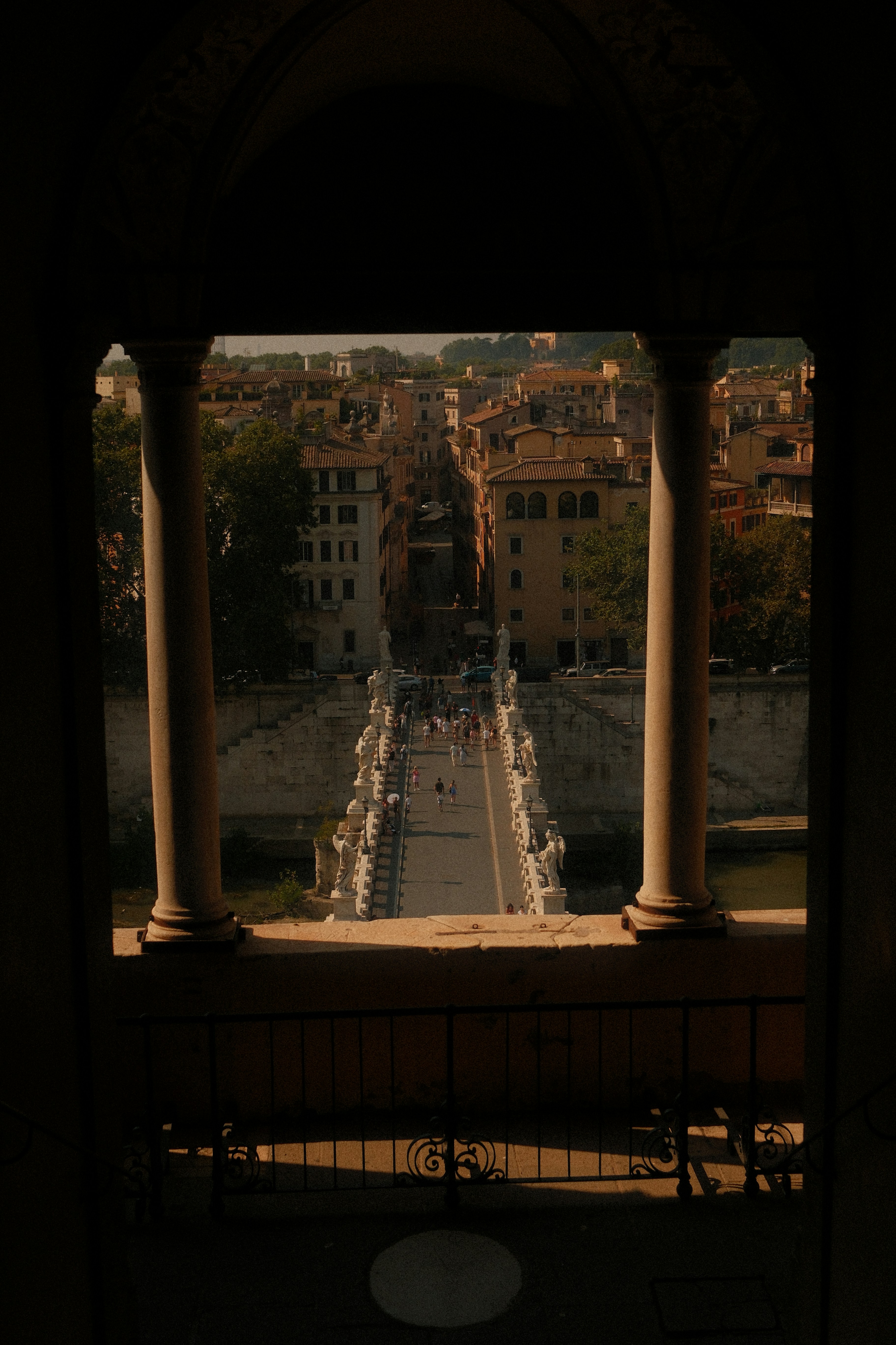 Vista from a Hidden Balcony: Pedestrian Bridge Framed by Archways