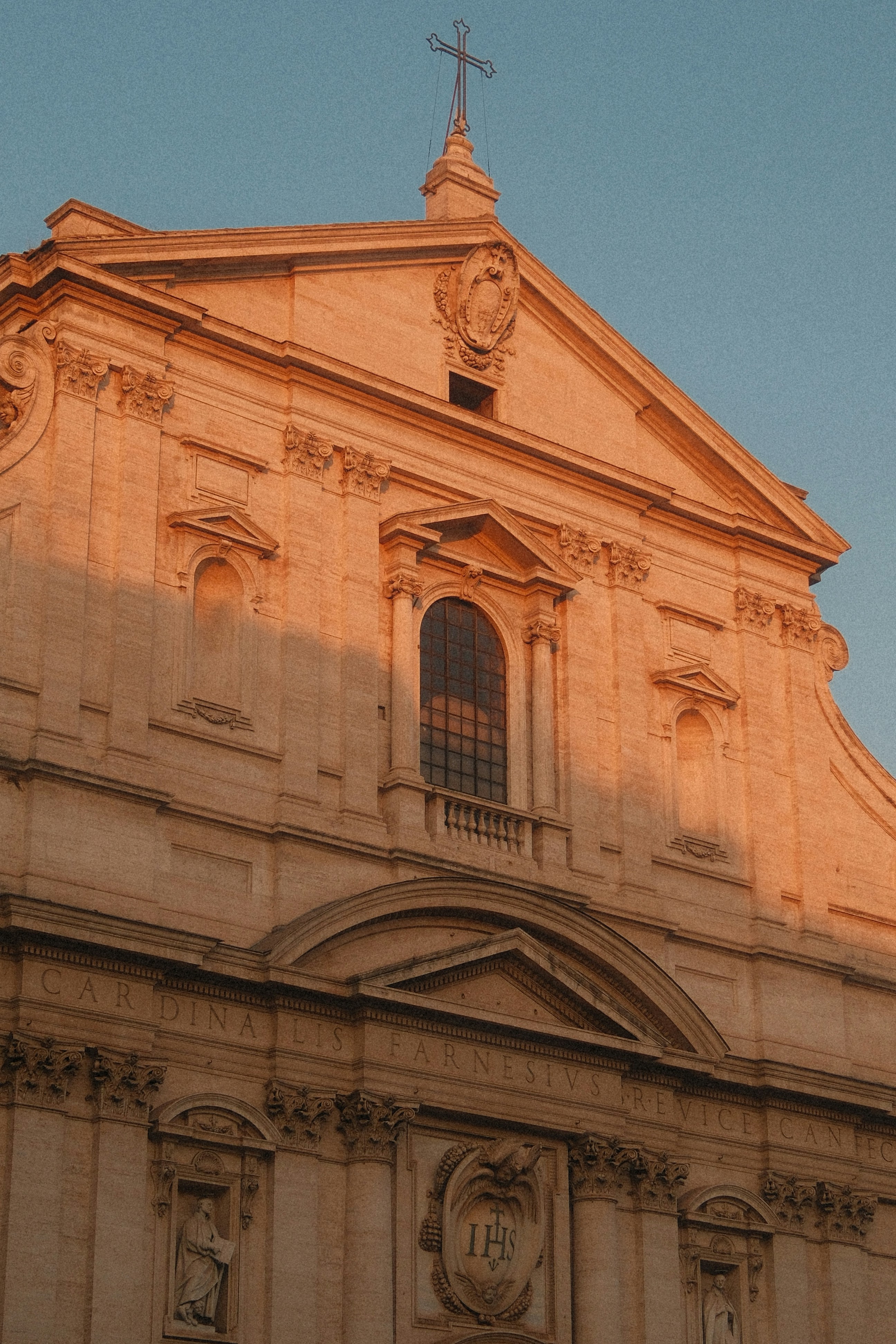 Golden Hour Facade: A Classical Church Illuminated at Sunset
