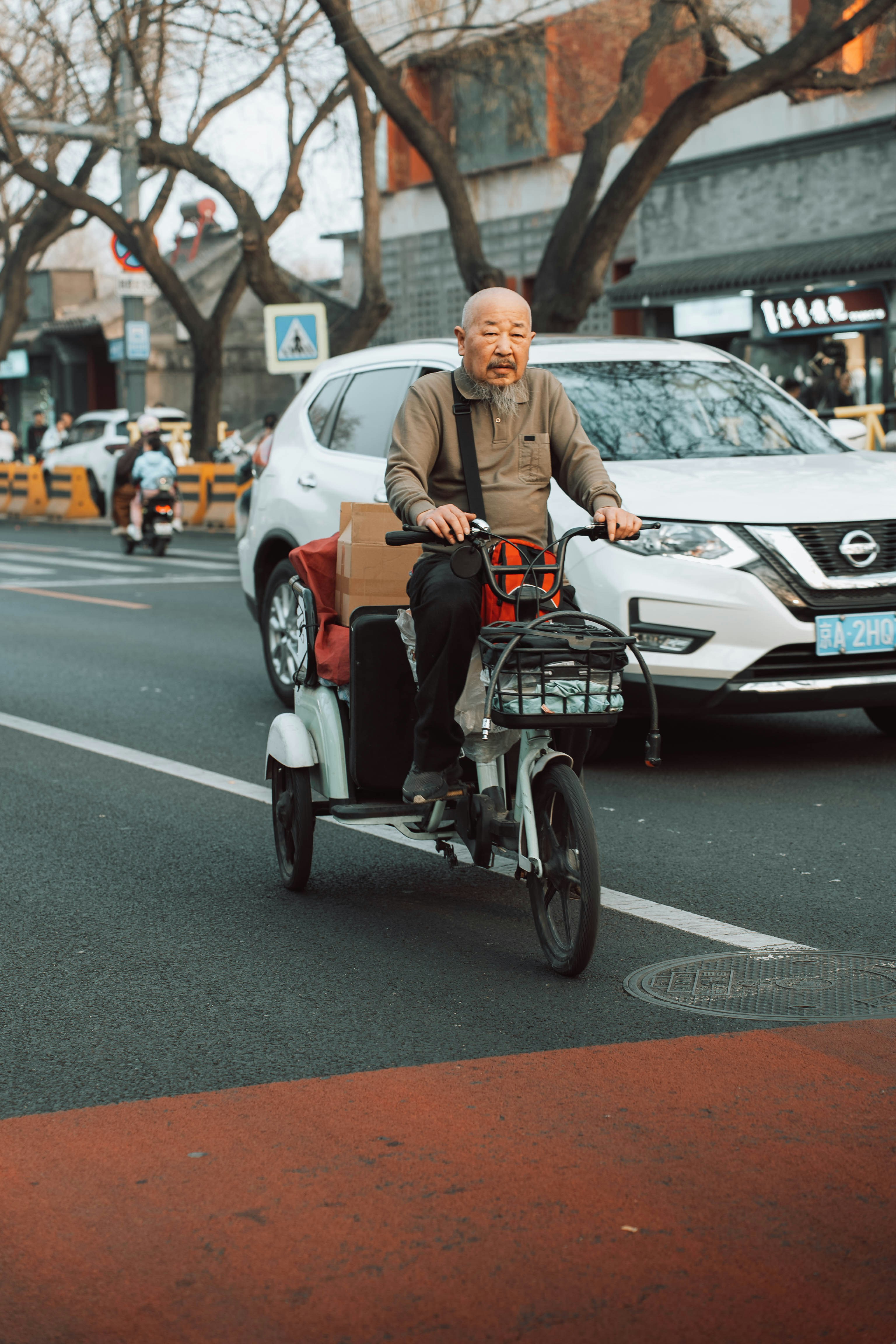 Pedicab Baron on a Busy Beijing Morning