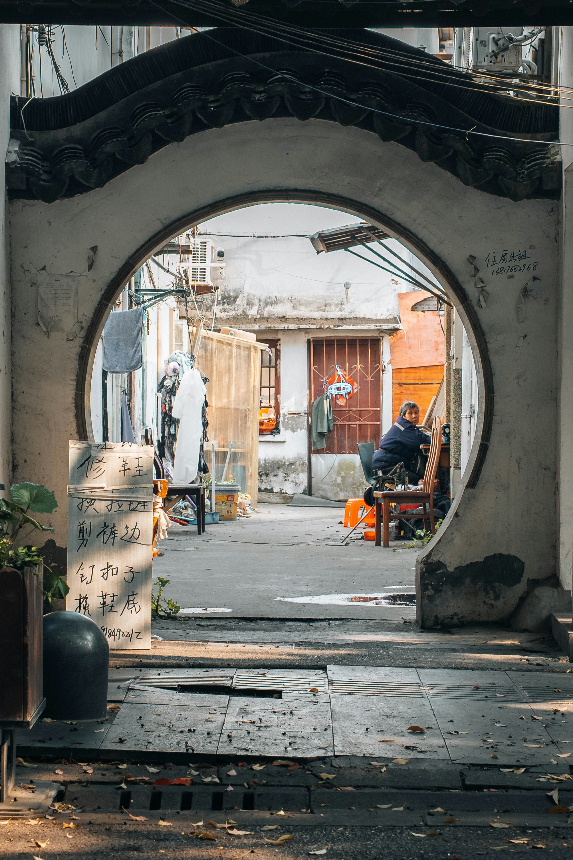 Through the Circular Gate: A Quiet Alley Workshop