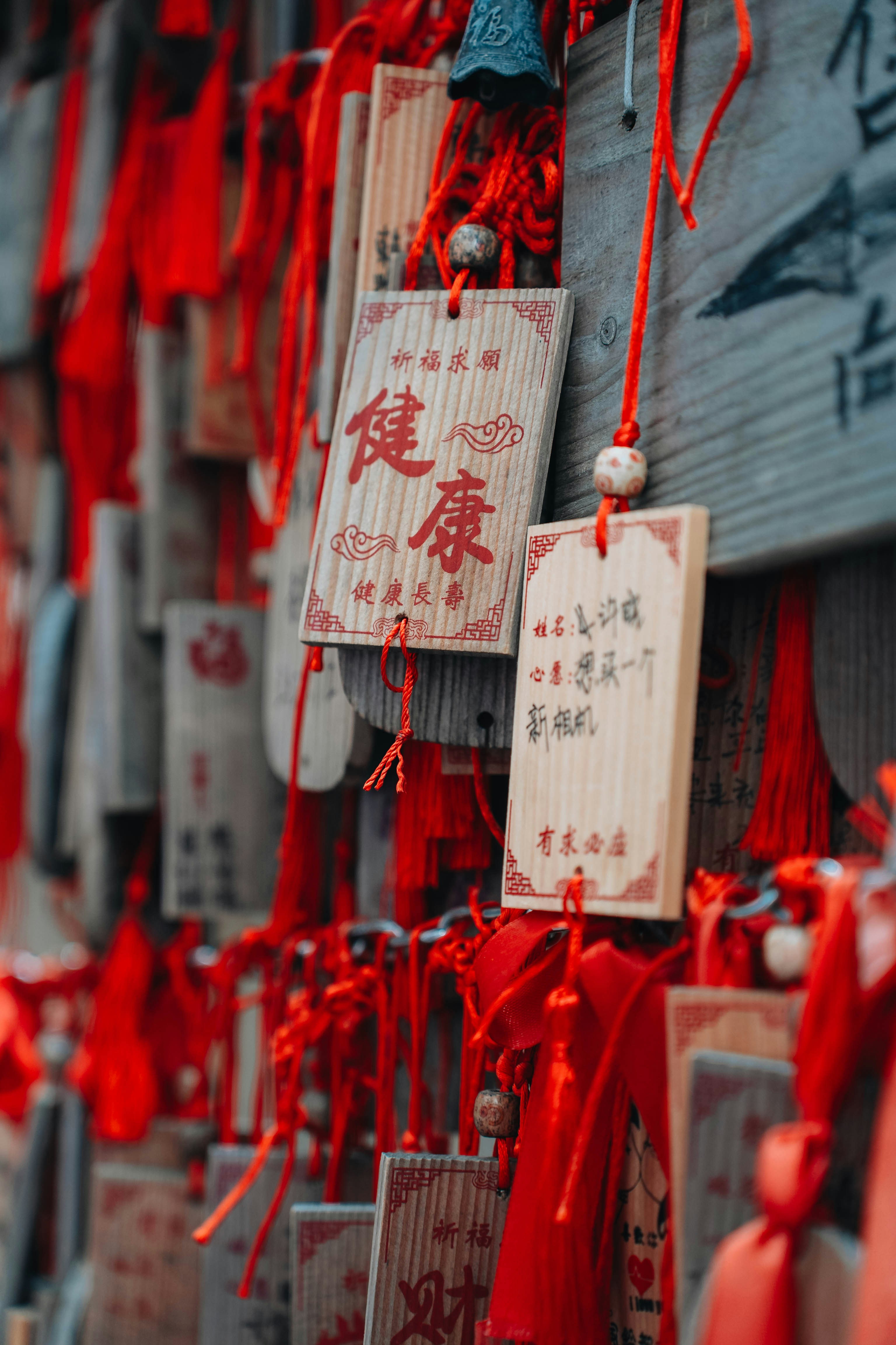 Red Strings of Wishful Cedar: Tanabata Tags on Weathered Wood