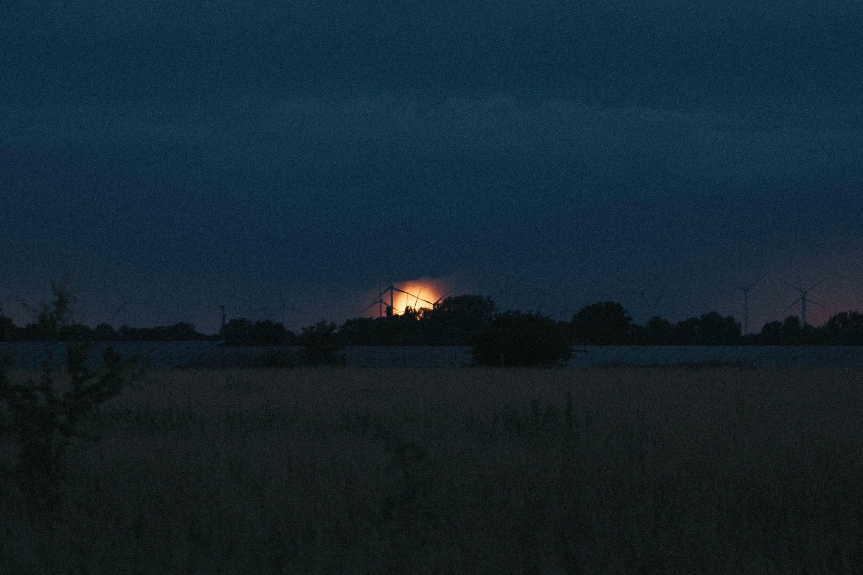 Distant Horizon: Twilight Power Plant Spark at Dusk